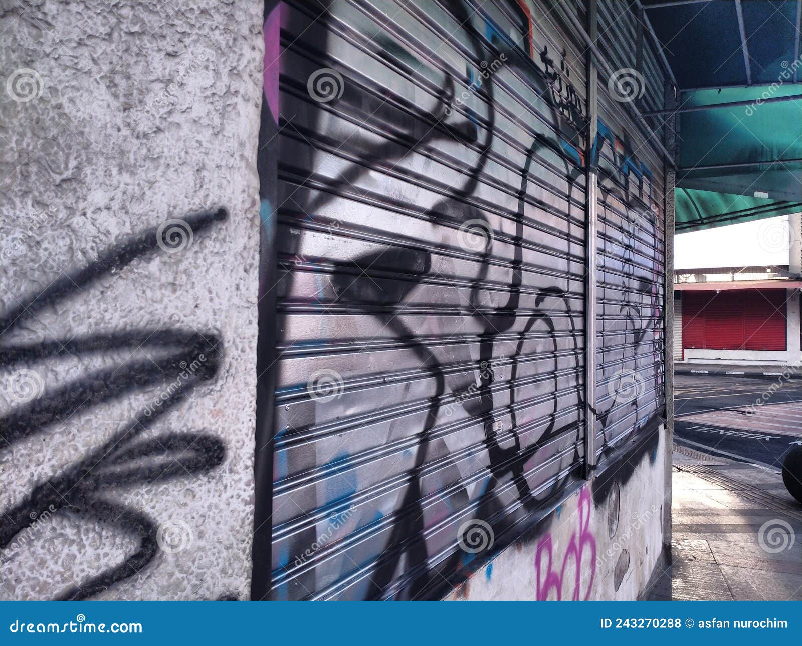 A Wall at the Corner of a City Full with a Graffiti Stock Photo - Image ...