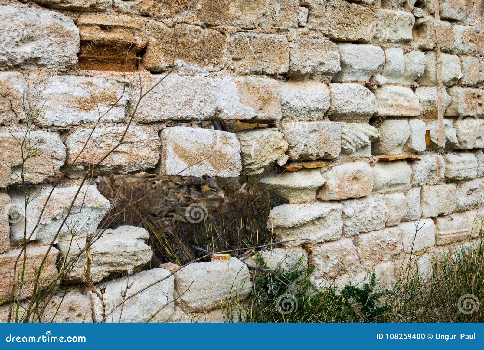 Wall almost crumbling down stock photo. Image of message - 108259400