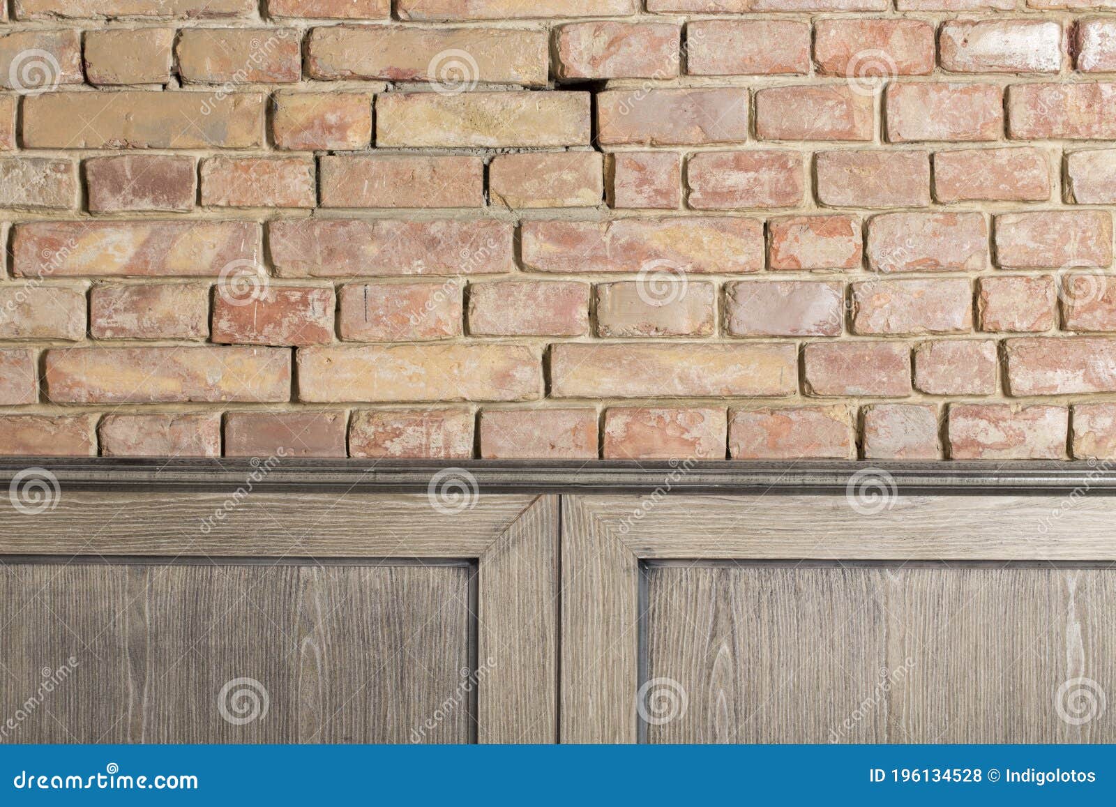 The Wall is Decorated Bricks and a Wooden Panel Stock Photo - Image of ...