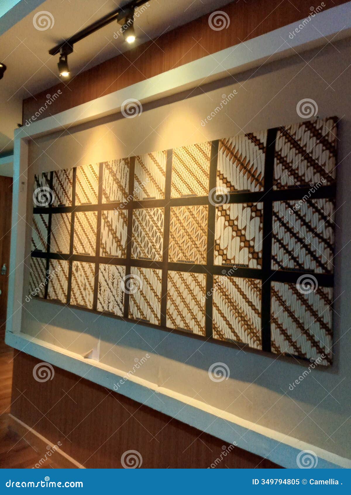A Wall Display Showcases Various Traditional Indonesian Batik Patterns ...