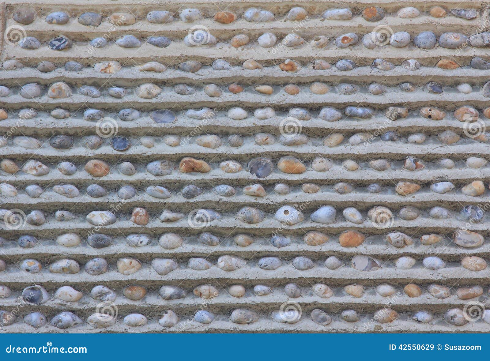 Wall with Embedded Pebble Stones Stock Image - Image of brown ...