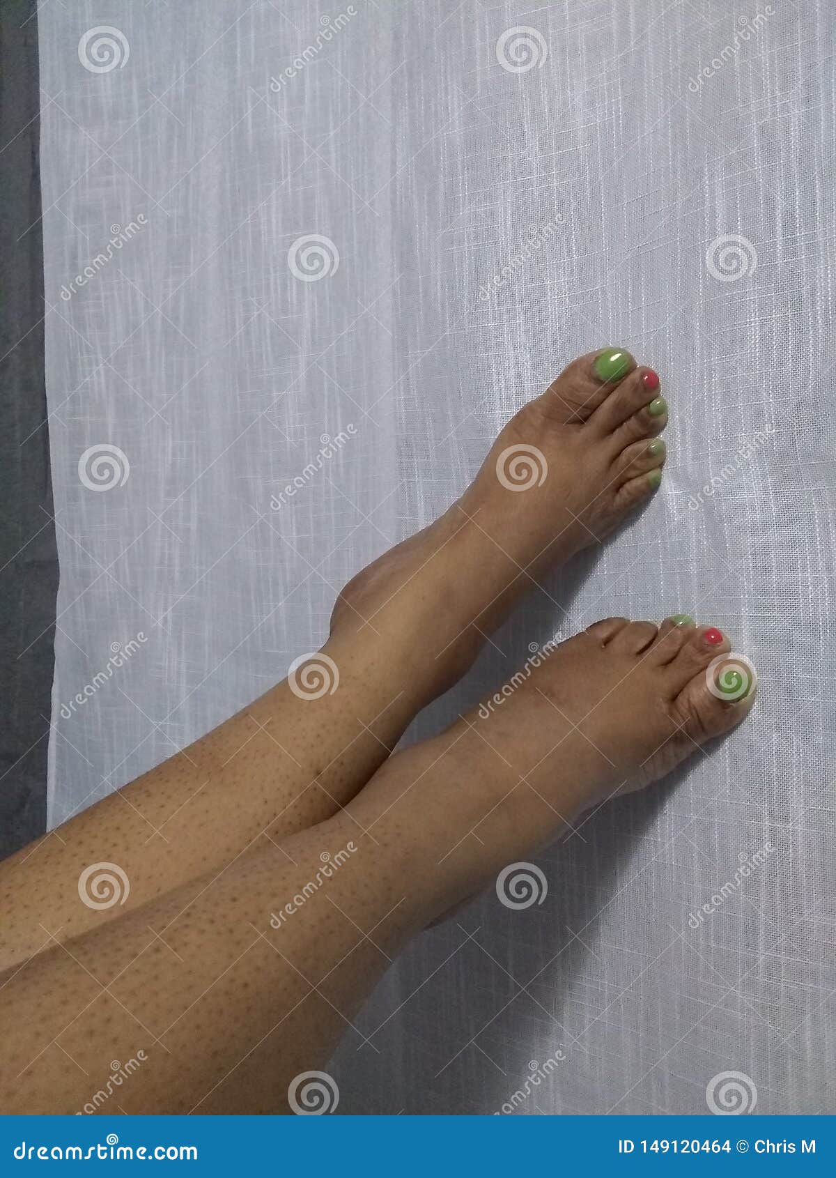 On the wall stock photo. Image of feet, ebonyfeet, legandfeet - 149120464