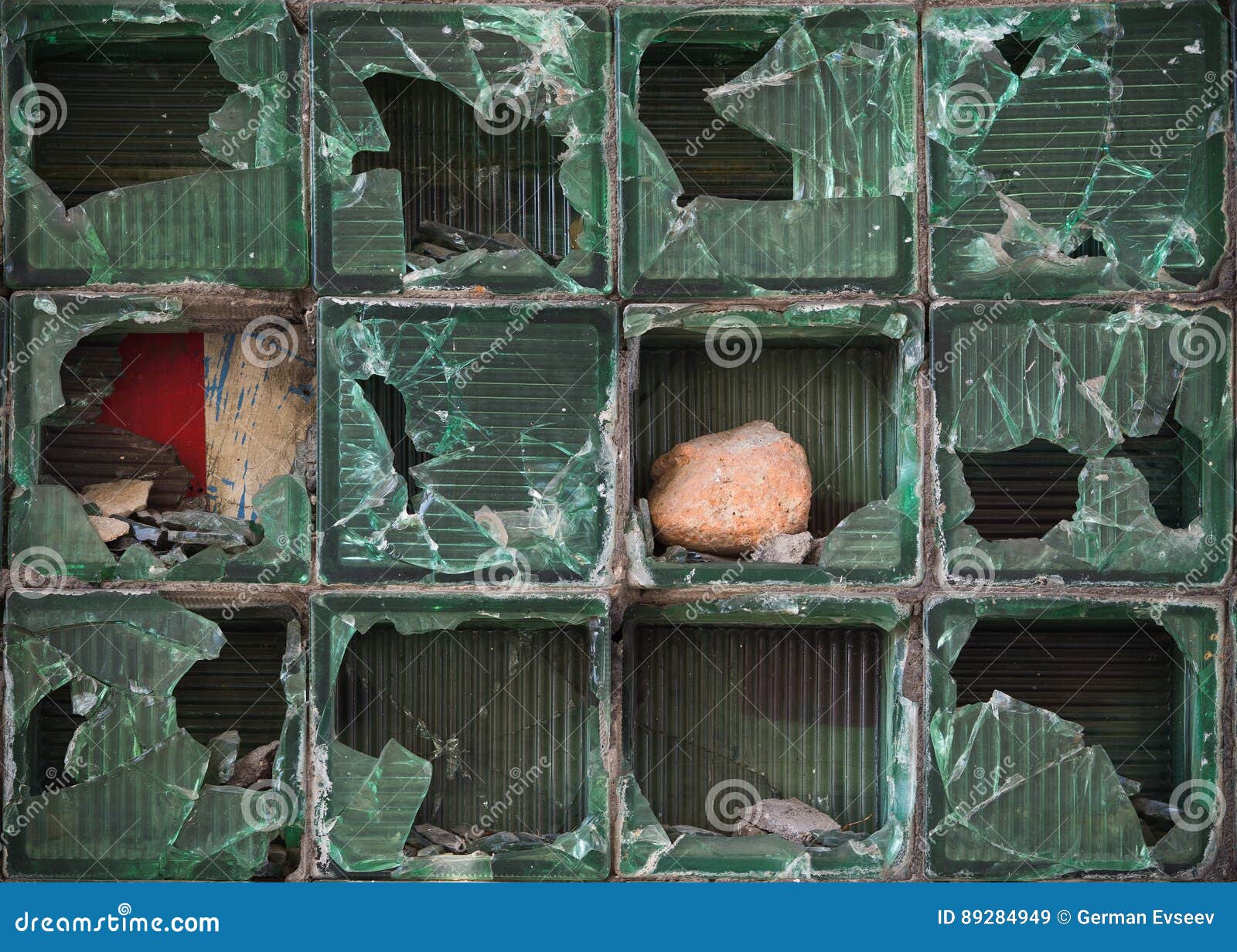 Wall of Glass Blocks is Broken by Stones Stock Image - Image of break ...