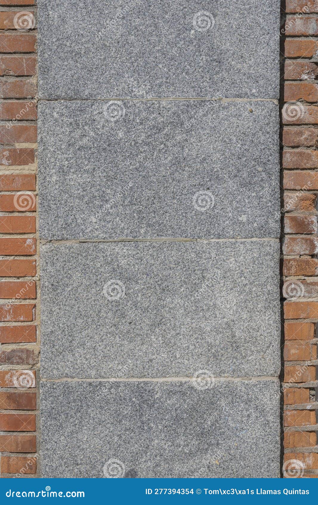 A Wall of Gray Granite Blocks Flanked Stock Photo - Image of antique ...