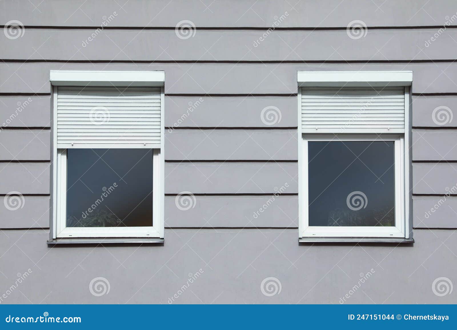Windows With Rolling Shutter On The Wooden House Facade Exterior ...