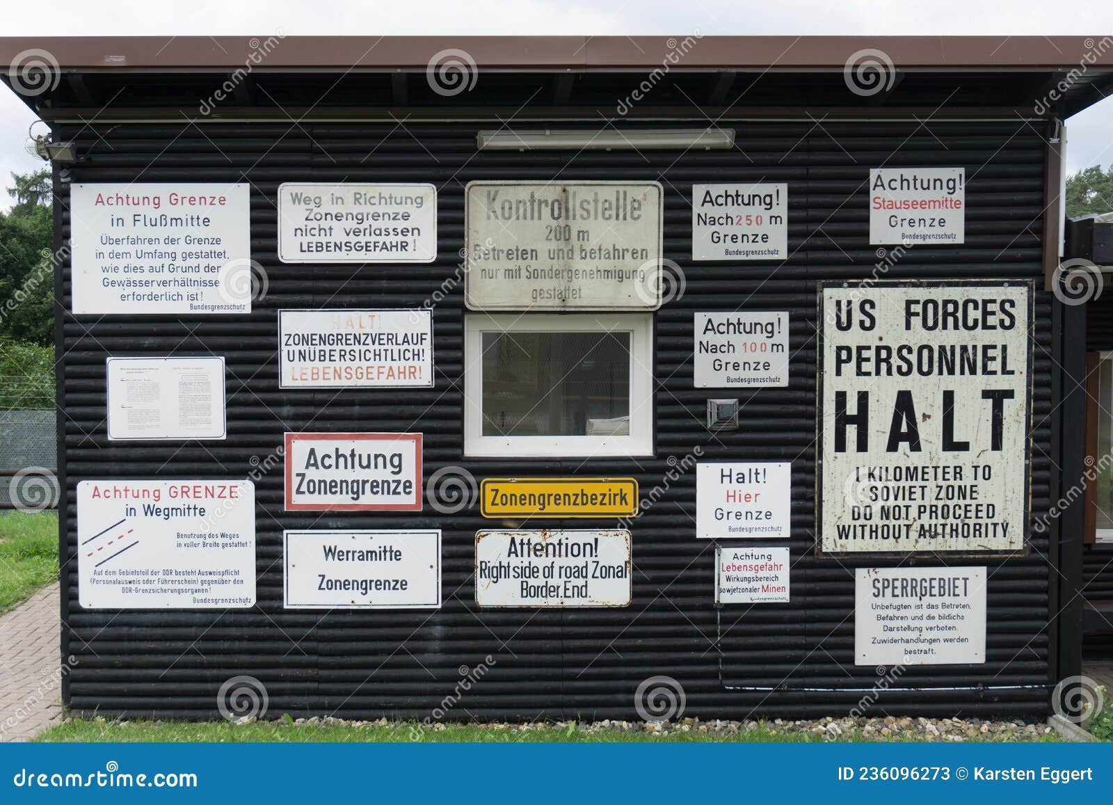 On the Wall Hang Various Signs and Information Boards of a German State ...