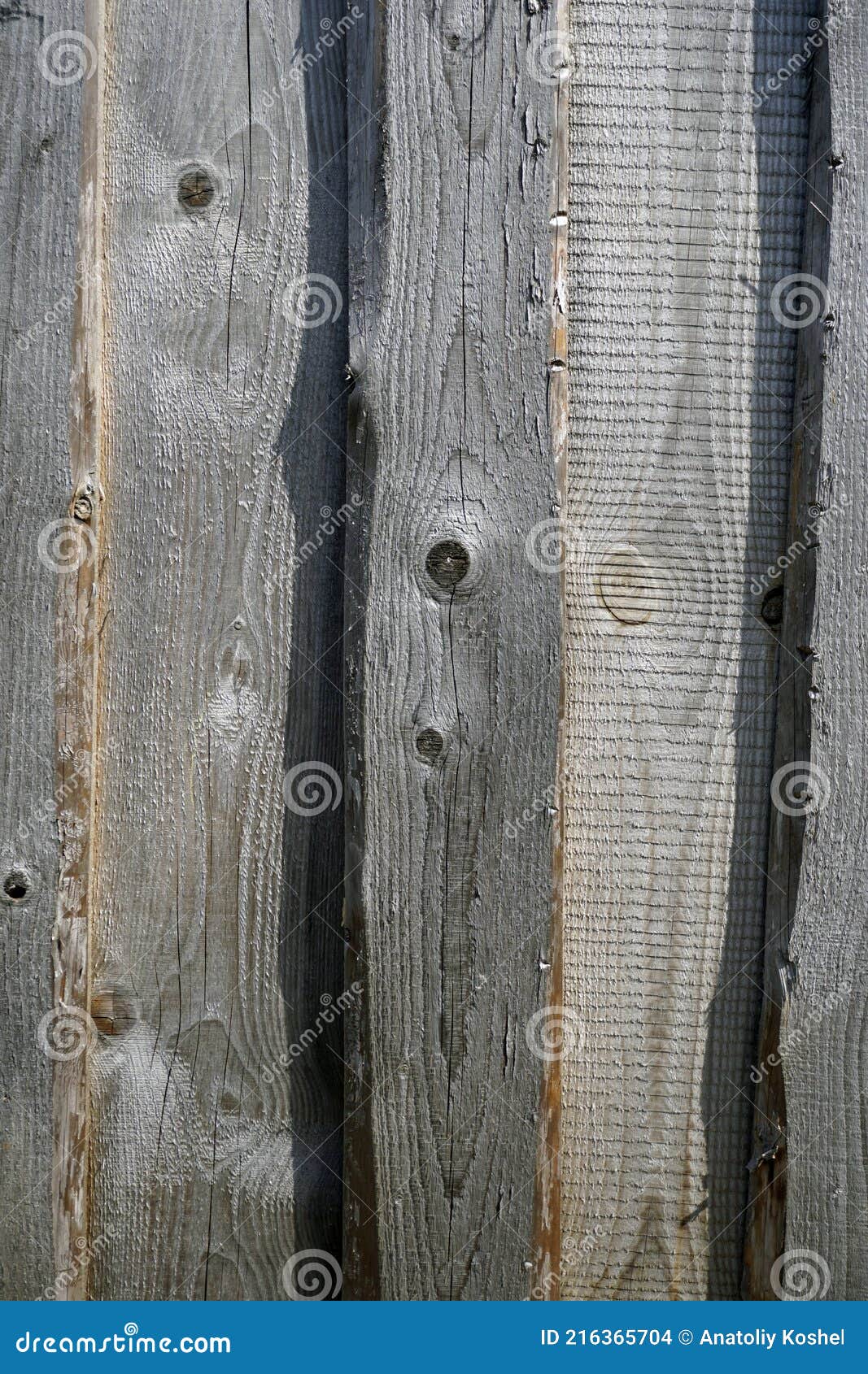 The Wall is Knocked Down from Non-planed Unedged Boards. Stock Photo ...