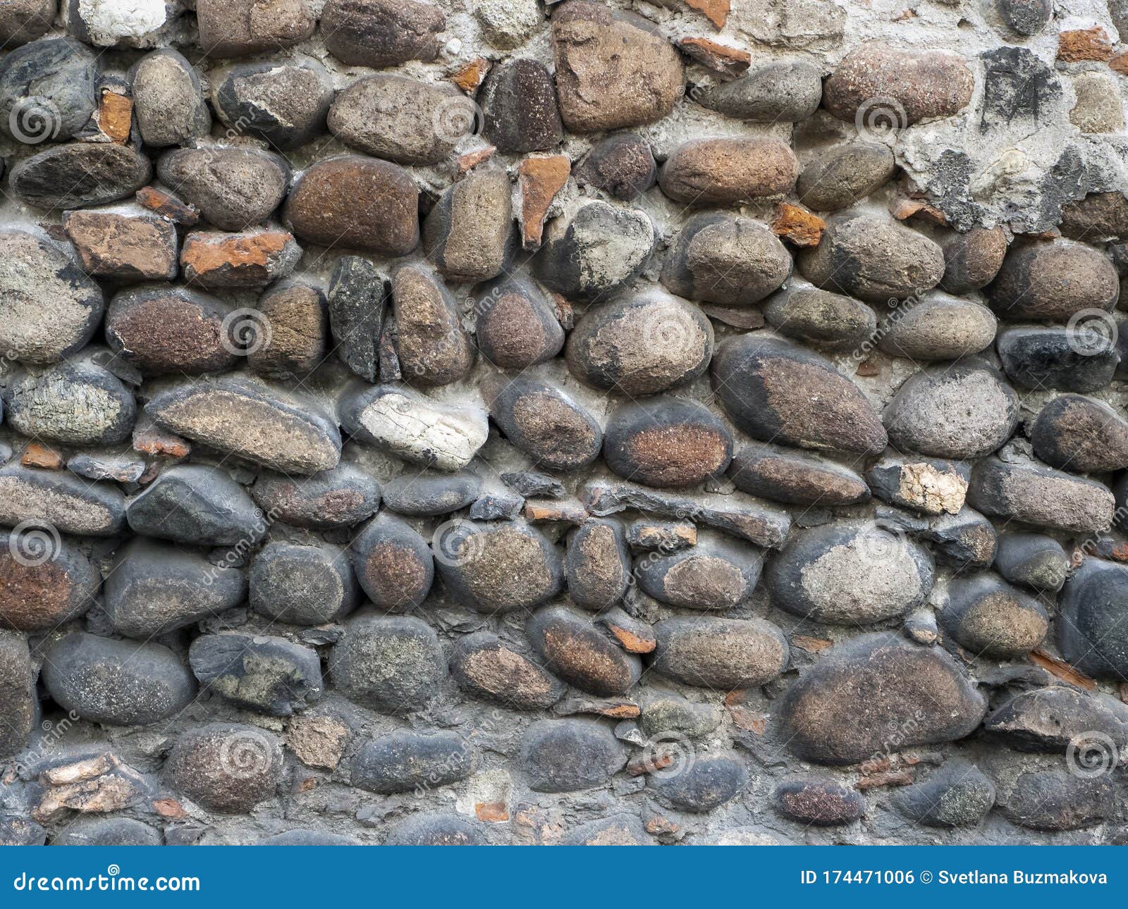Wall of Large Cobblestones. the Stones are Closely Pressed Together and ...