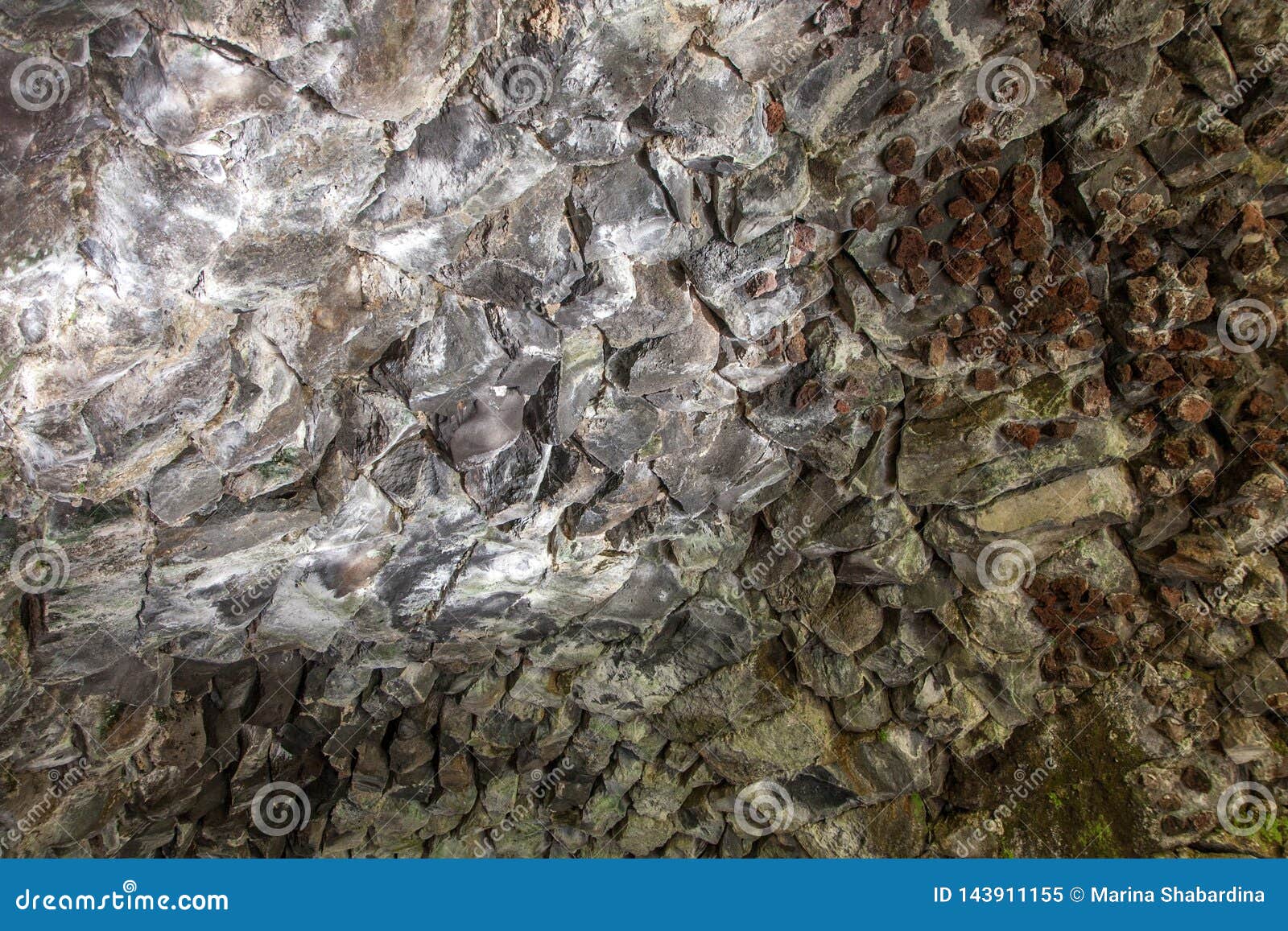 The wall of the lava cave stock image. Image of cobblestone - 143911155