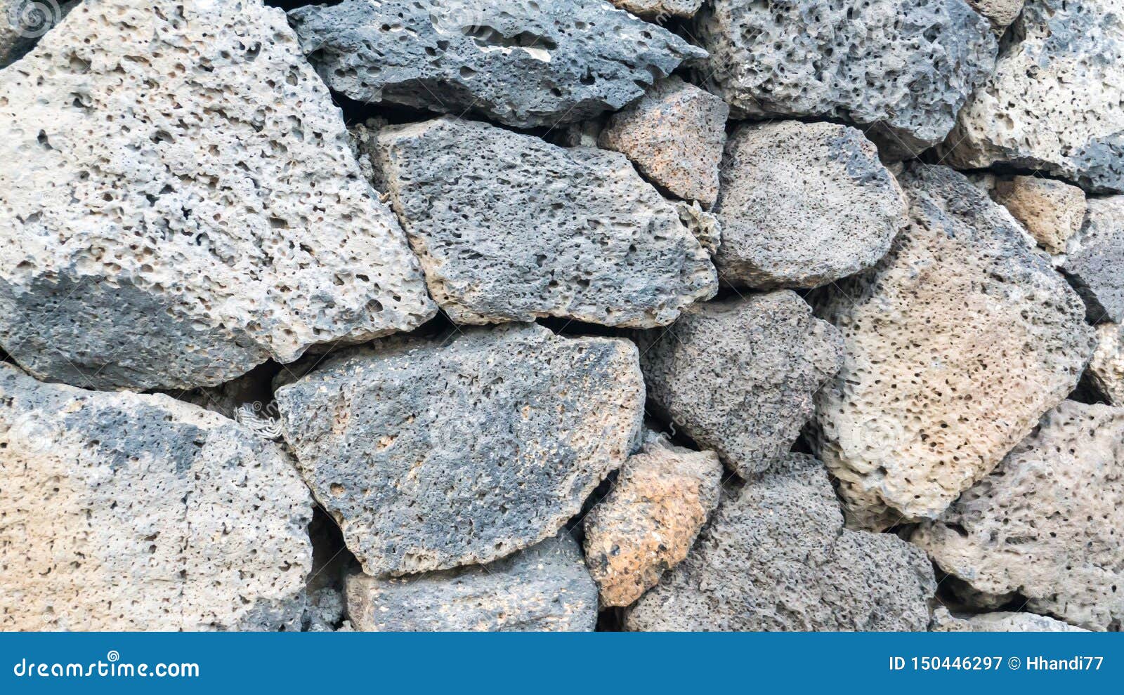 Wall of lava rocks stock image. Image of stone, aged - 150446297