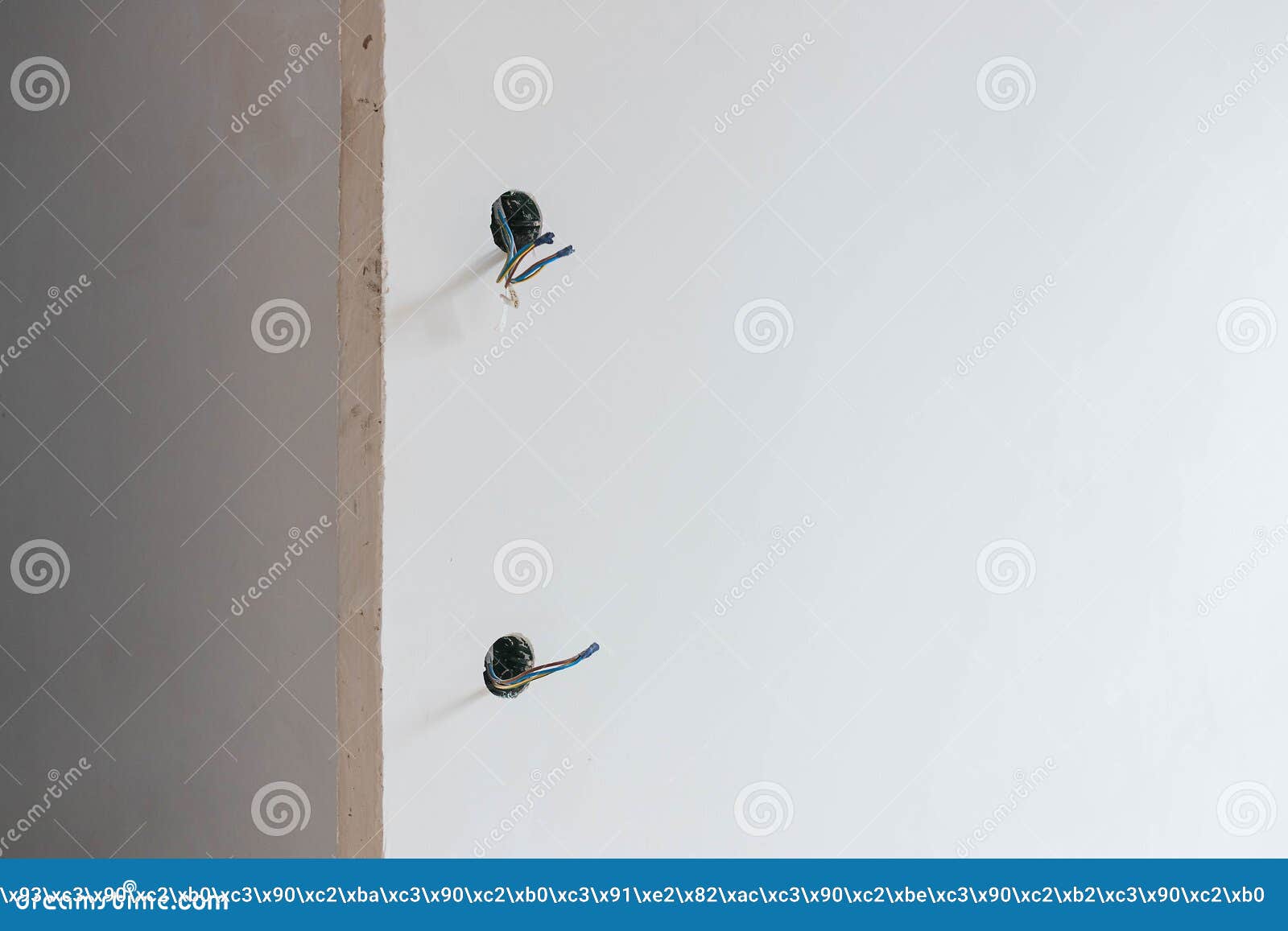 Wall is of Light-colored Plaster and Has Several Outlets. Professional ...