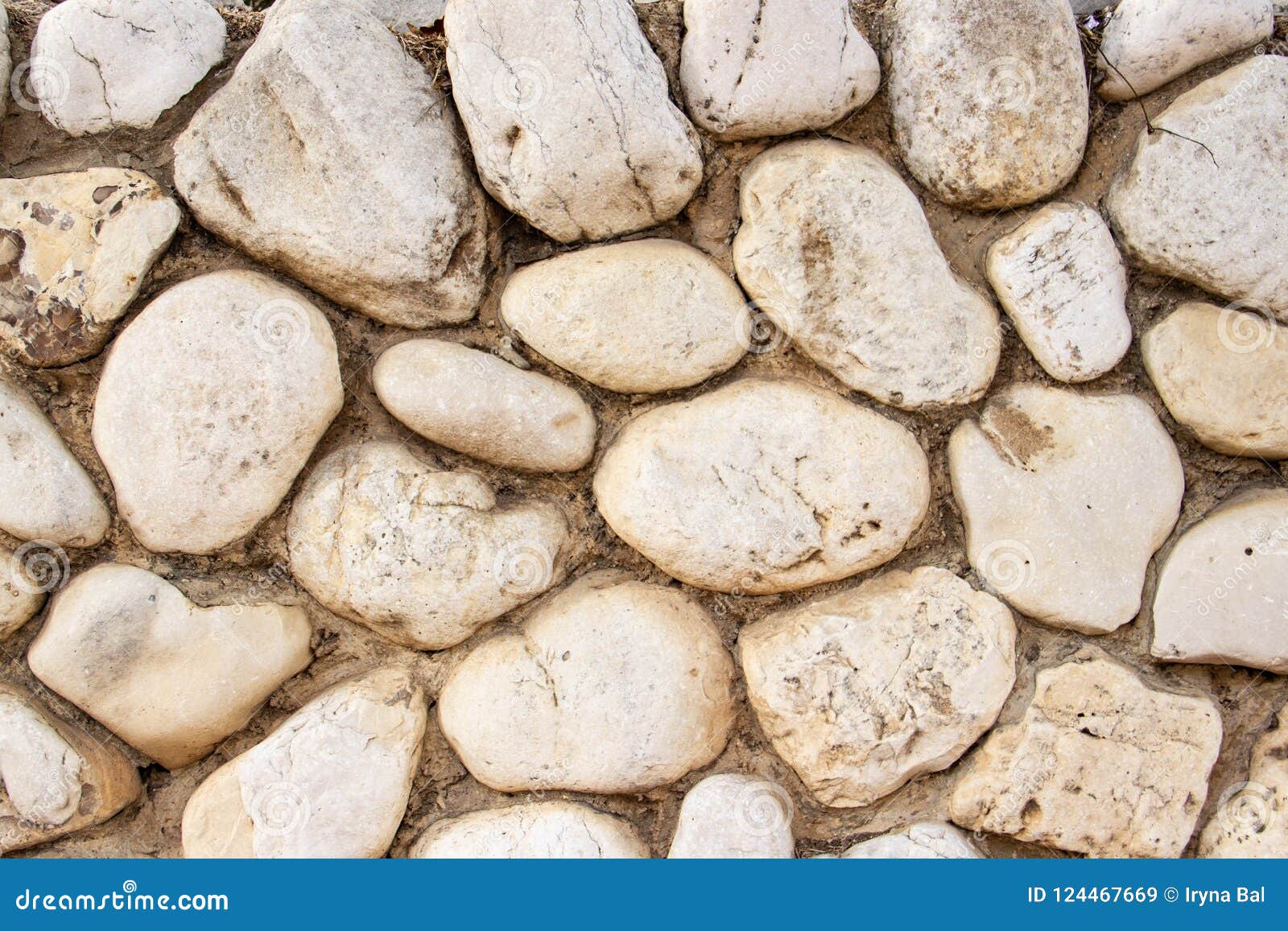 Wall of Light Round Smooth Stones Stock Image - Image of scale, base ...