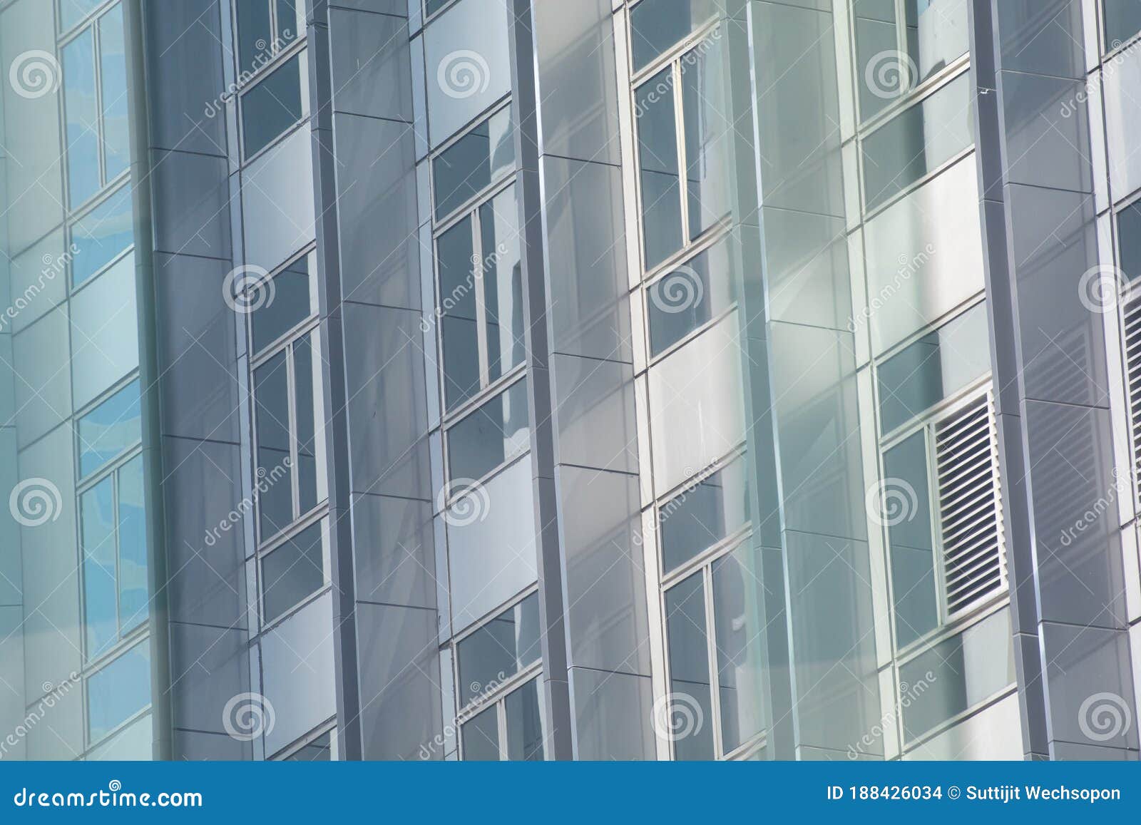 A Wall with a Lot of Square Glass Windows on the Building. Geometric ...