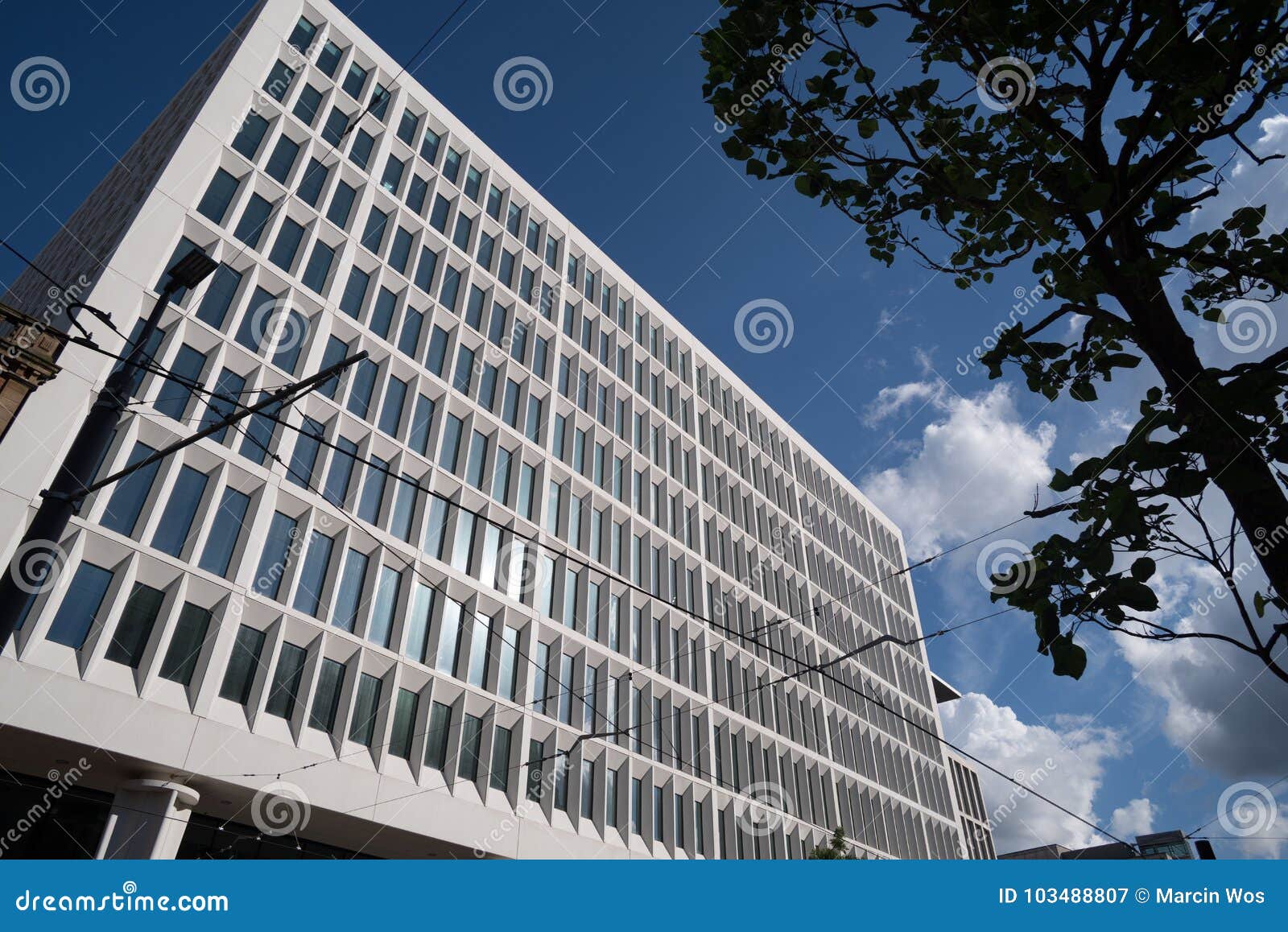 A Wall with a Lot of Square Glass Windows on the Building. the Rhythm ...