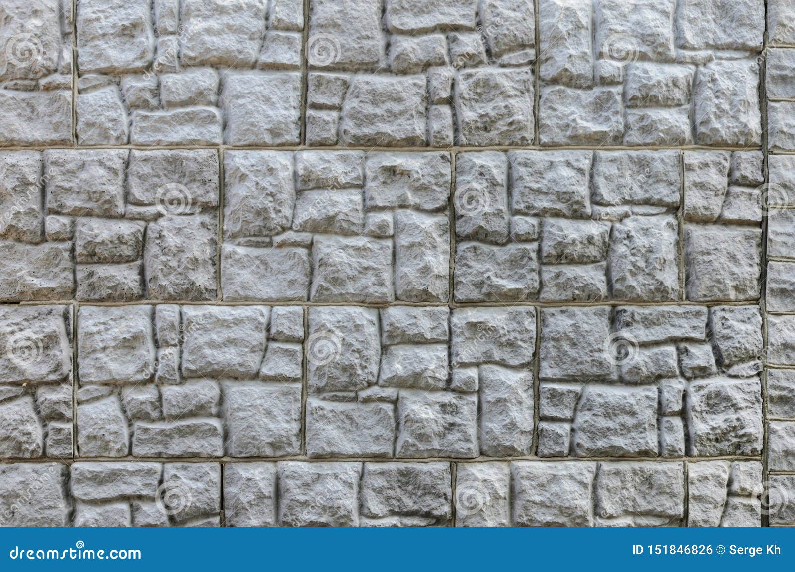 Wall Made Of Artificial Stone. Finishing The Facade Of The Building ...