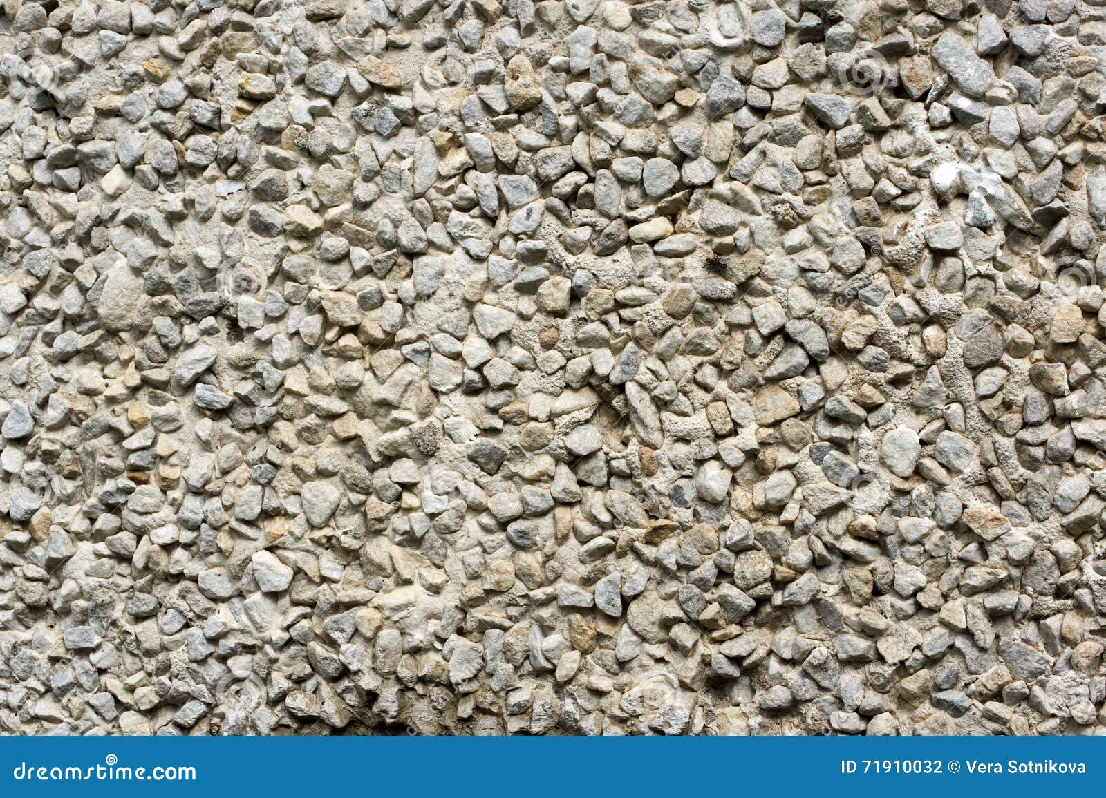 The Wall Made of Concrete Panels Consisting of Small Stones Stock Photo ...