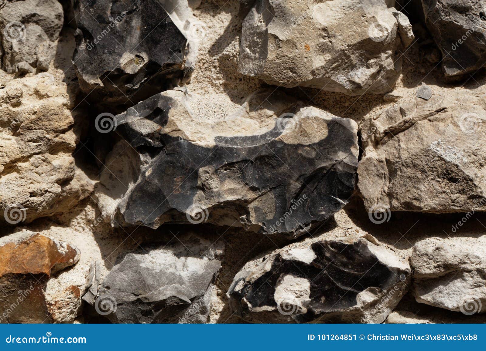Wall made of flint stone stock image. Image of masonry - 101264851