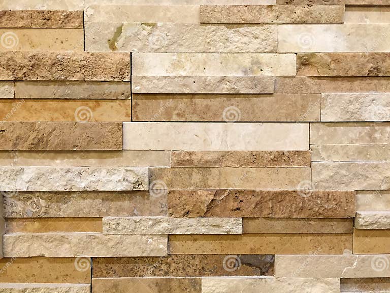Wall Made of Oblong Shape Rocks Stock Image - Image of cement, concrete ...