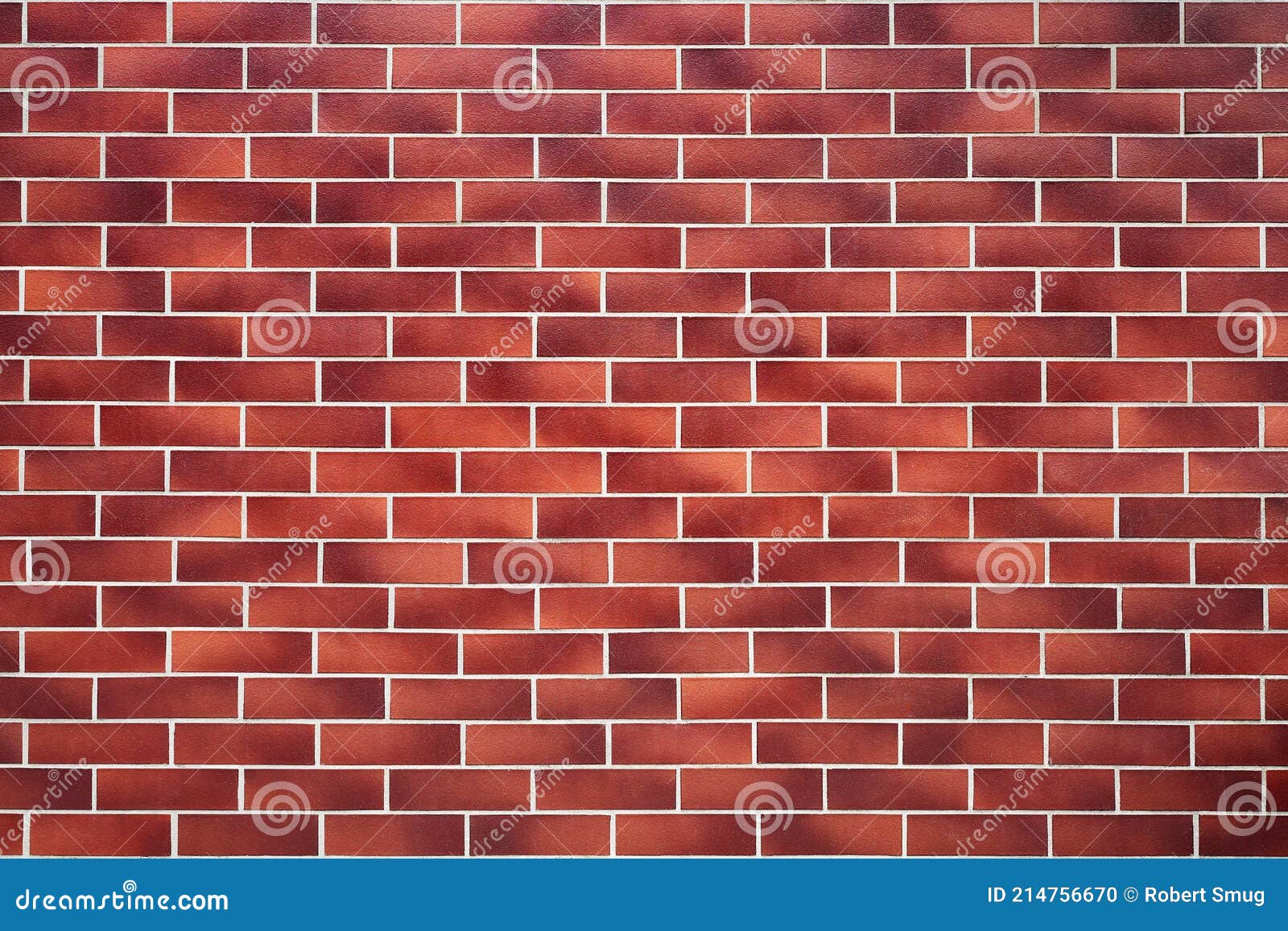 A Wall Made of Red Brick in Various Shades Stock Photo - Image of ...