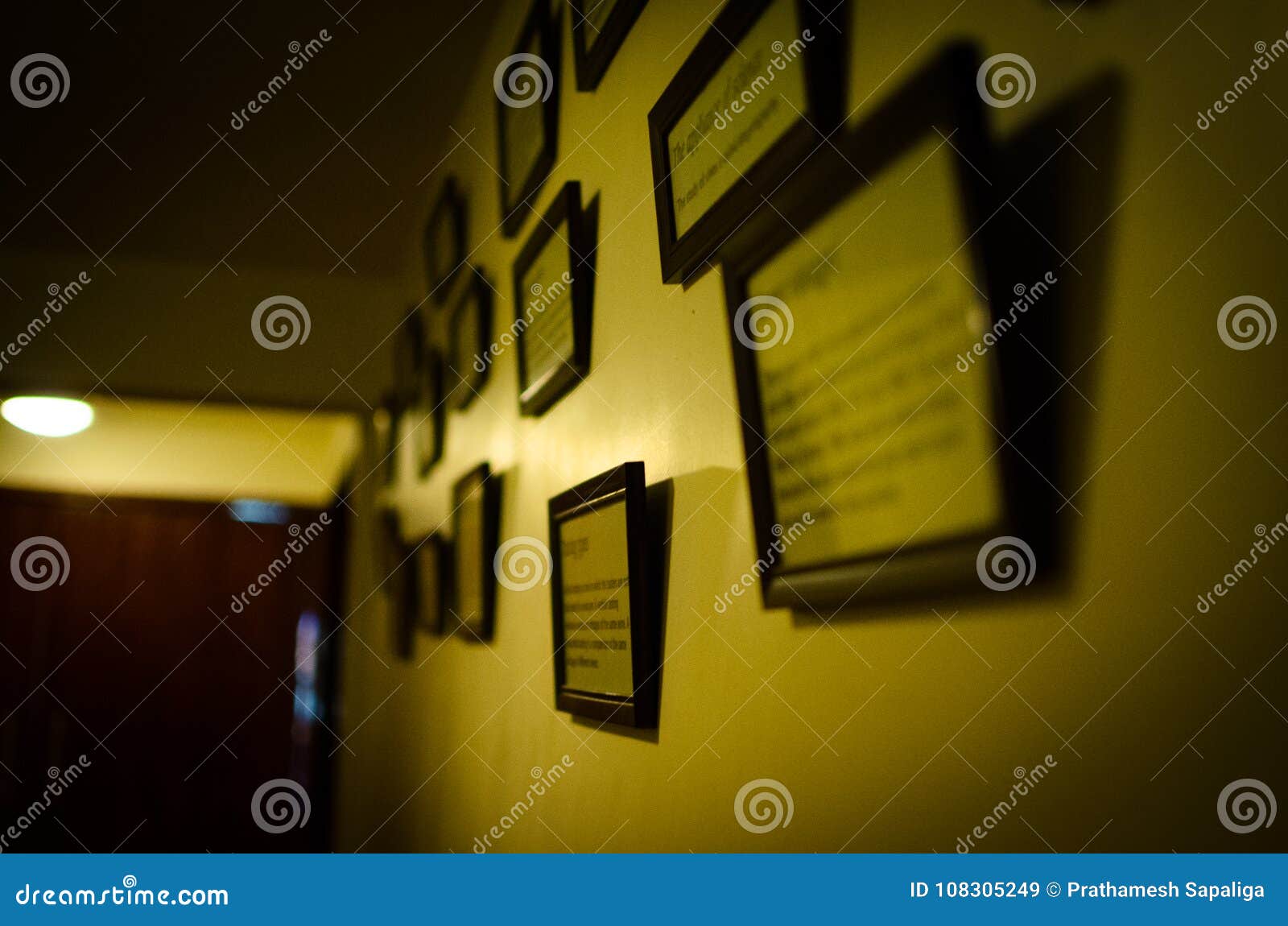 Wall with Many Frames Hanging on it Stock Image - Image of element ...