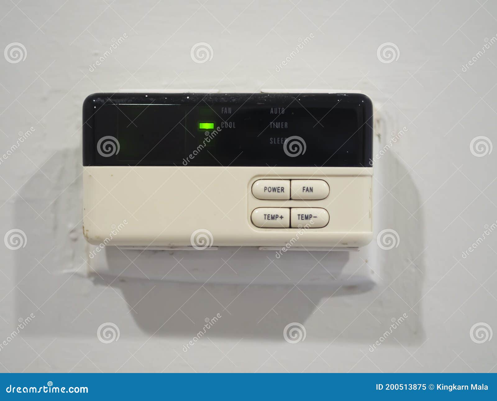 Wall Mounted Air Conditioner Remote Control on a White Cement Wall ...