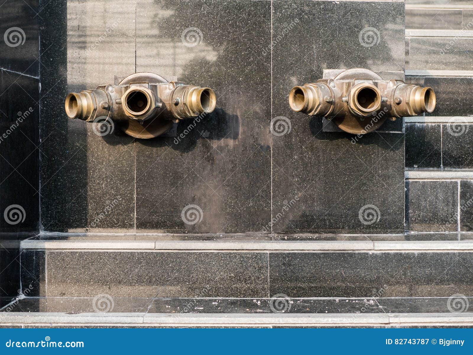 Wall Mounted Fire Hydrant Stock Photos - Royalty Free Pictures
