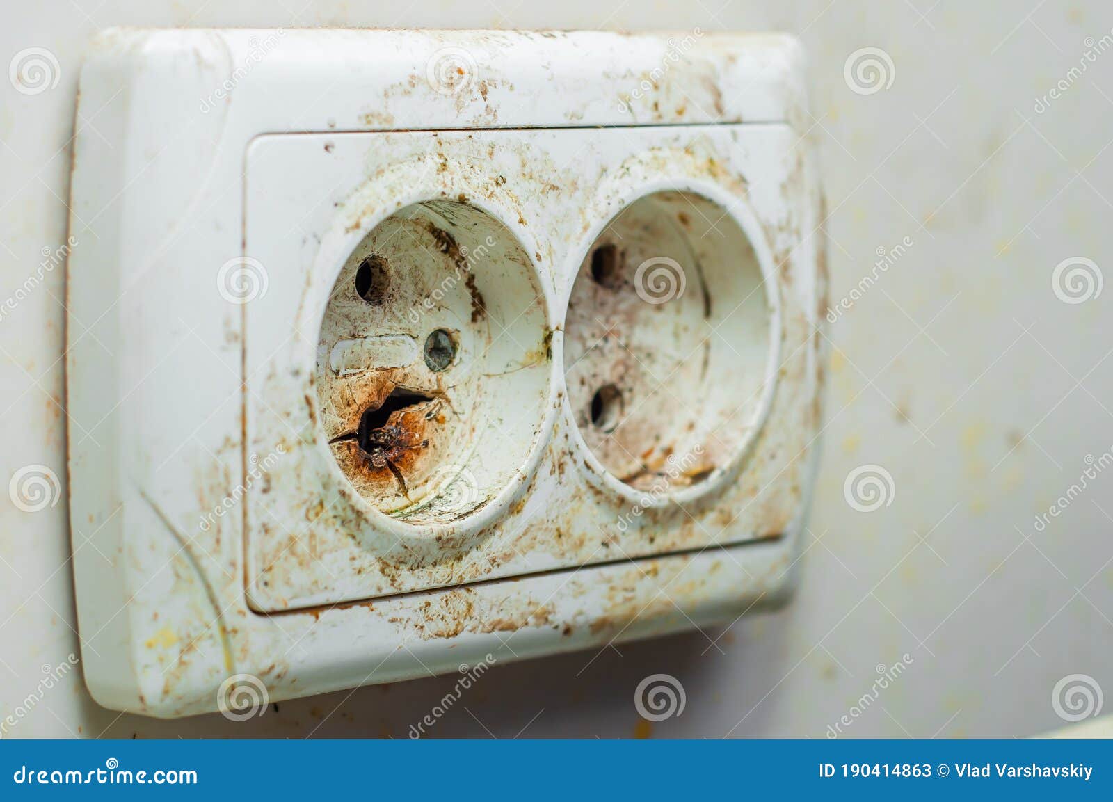 Wall-mounted Plastic Outlet in Very Poor Condition, Dirty and Burnt ...