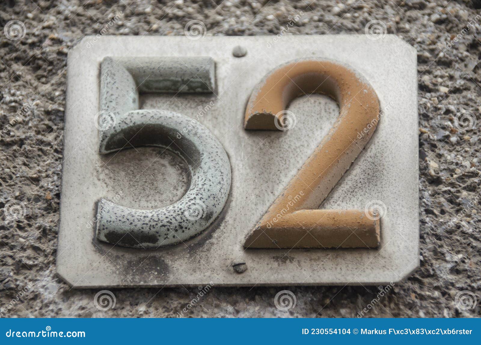 A Wall with the Number Five-two Stock Photo - Image of circle, digits ...