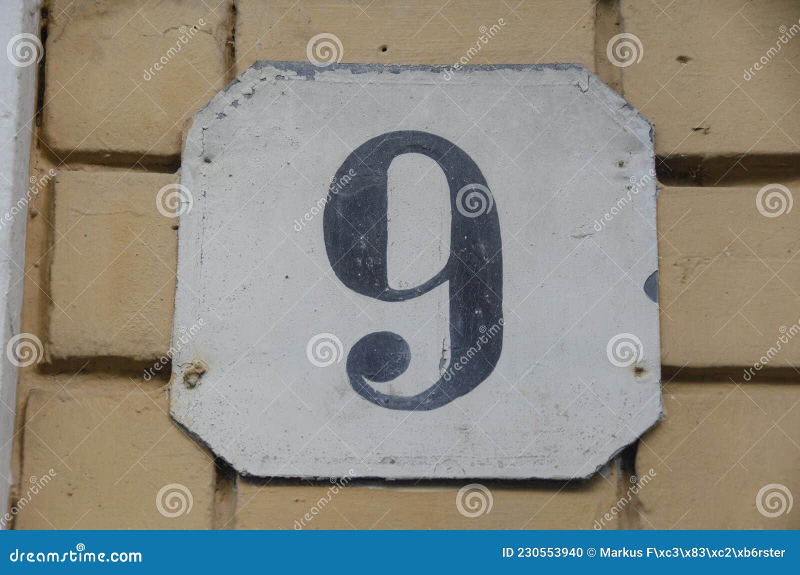 Wall with the number nine stock photo. Image of figure - 230553940