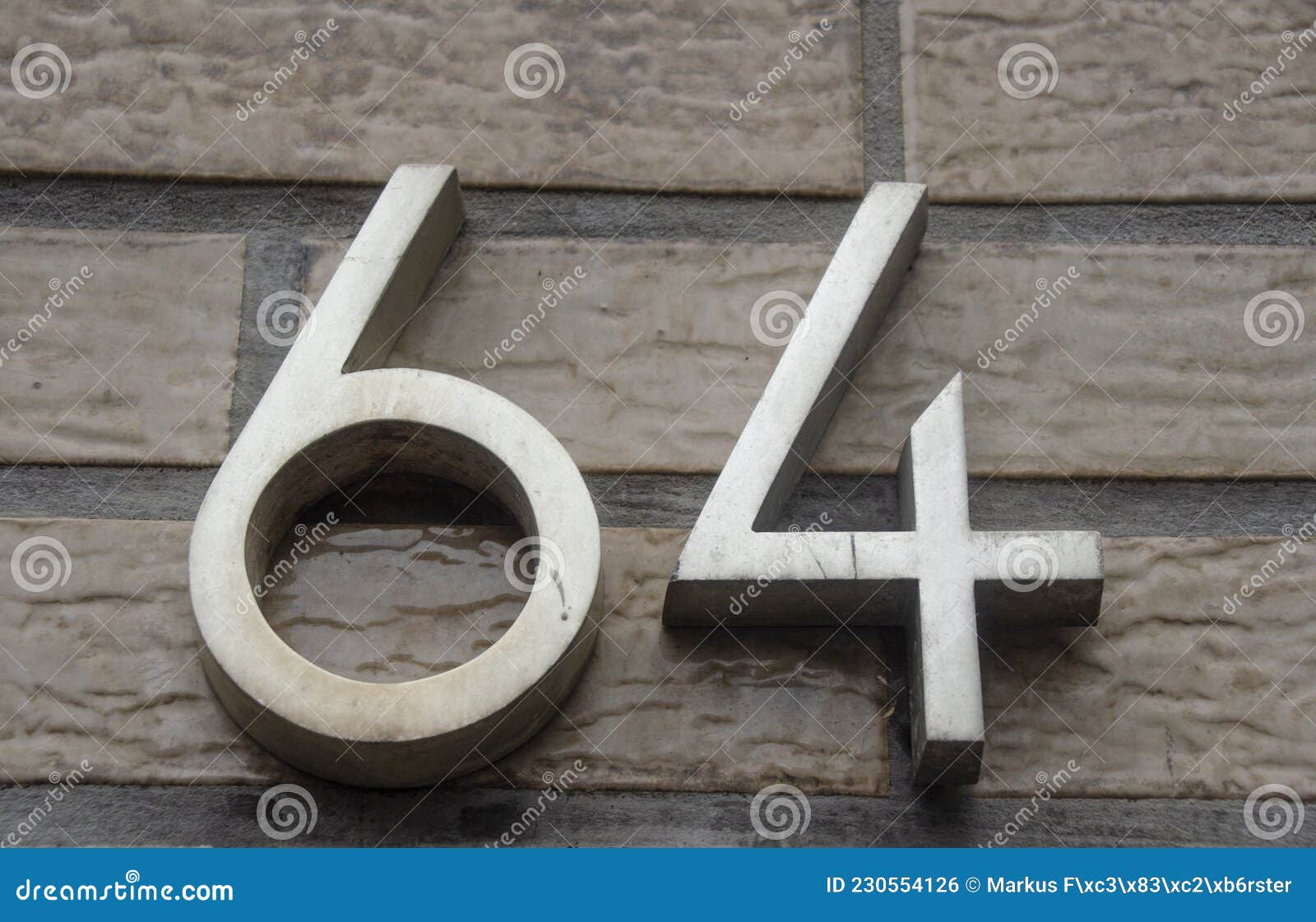 A Wall with the Number Sixty-four Stock Photo - Image of bumper ...