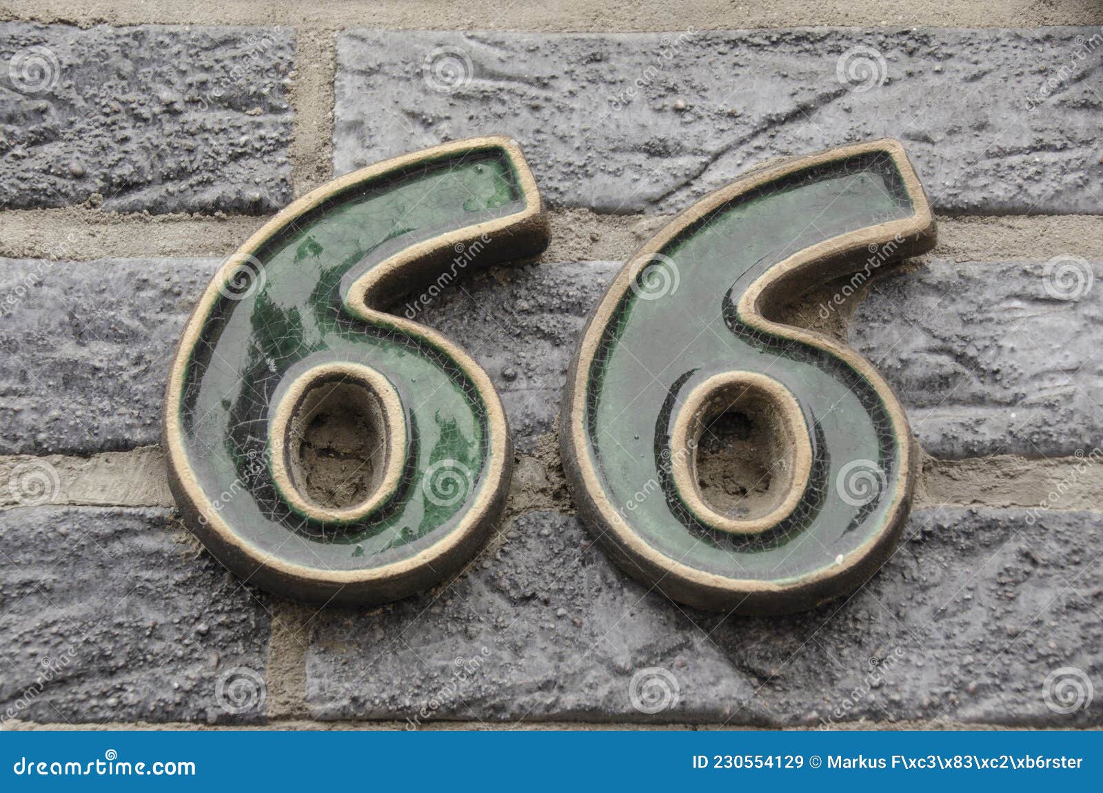 A Wall with the Number Sixty-six Stock Image - Image of green, tire ...