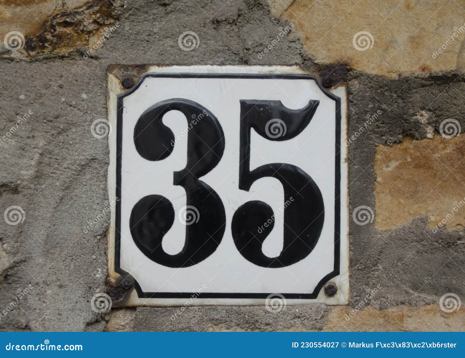 A Wall with the Number Thirty-five Stock Image - Image of door, house ...