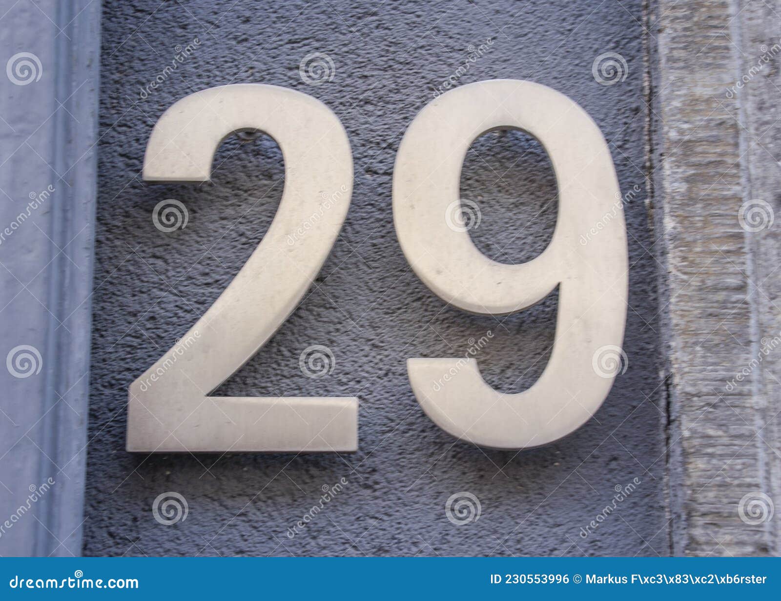 A Wall with the Number Twenty Nine Stock Photo - Image of closeup, gold ...