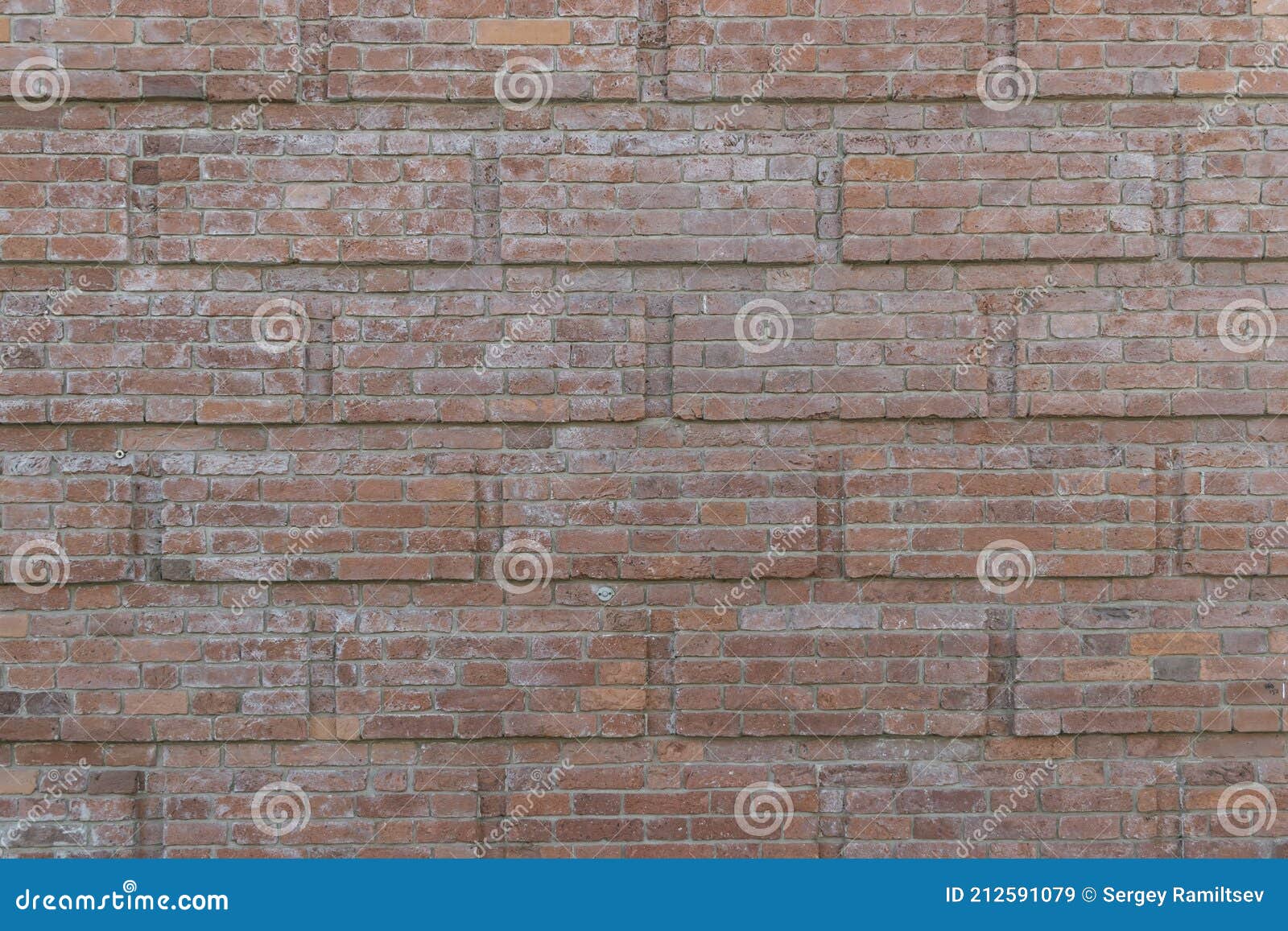 A Wall of Old, Cracked Bricks, with a Weathered and Faded Surface ...