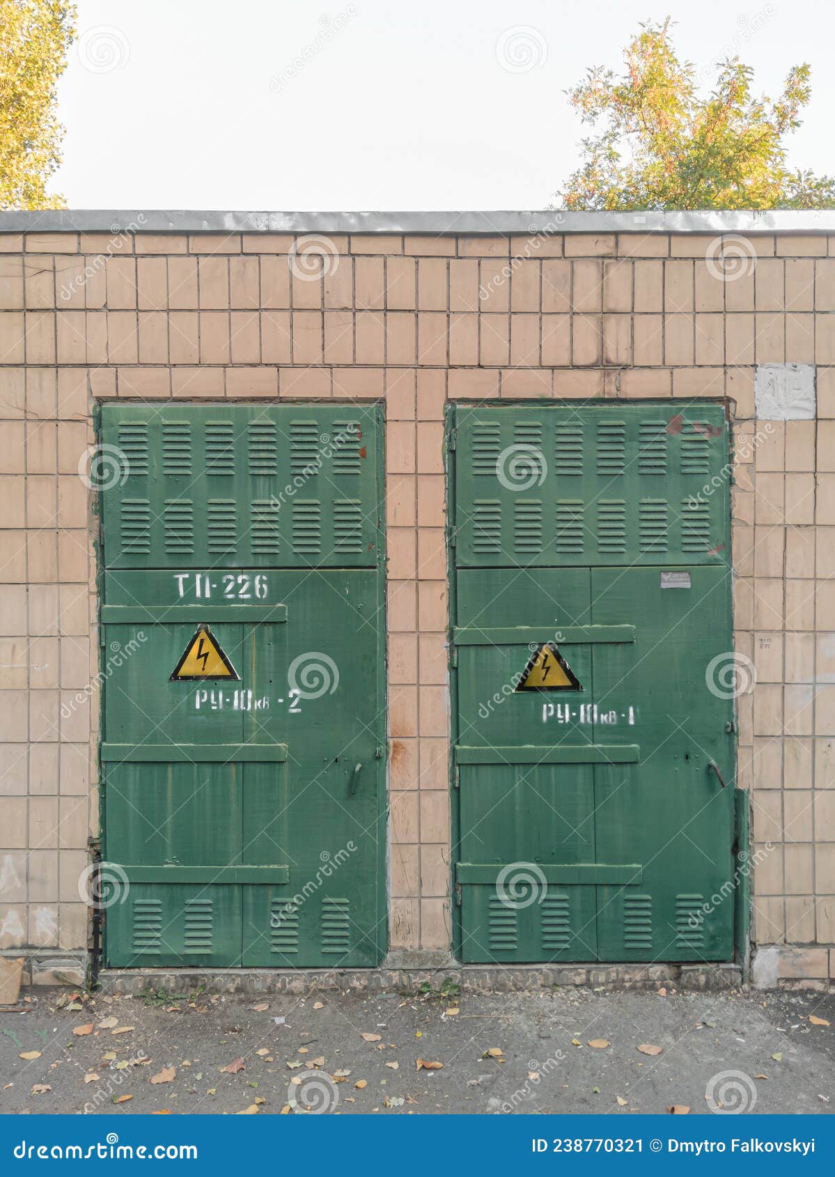 Wall of an Old Soviet Step-down Electrical Substation with a Green Door ...