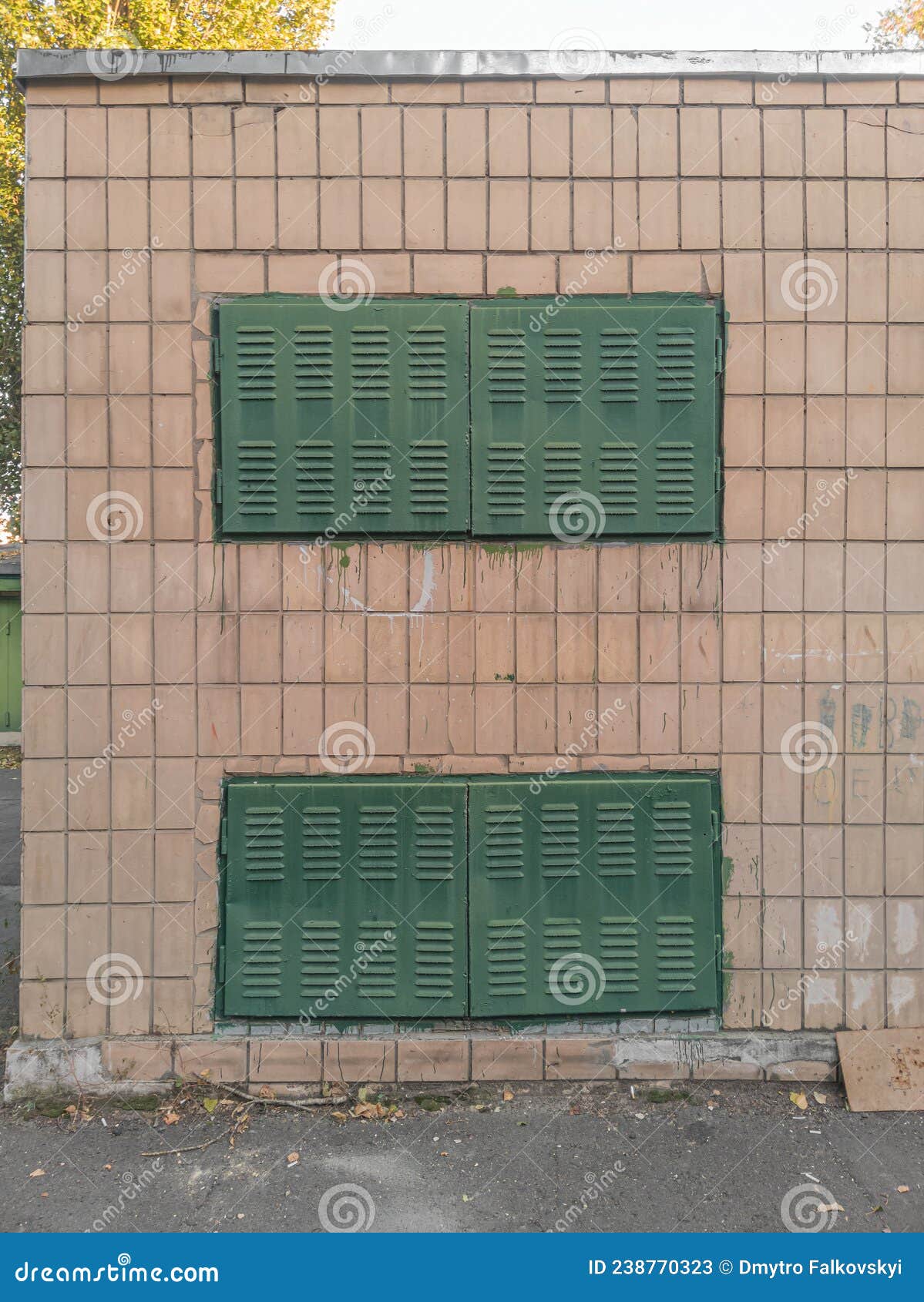 The Wall of the Old Soviet Step-down Electrical Substation with Green ...