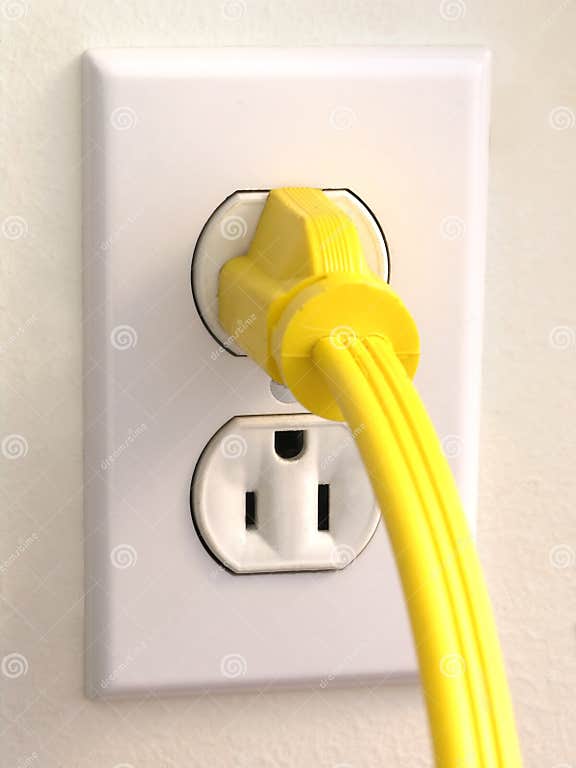 Wall Outlet - Yellow Plug stock image. Image of building - 2029091
