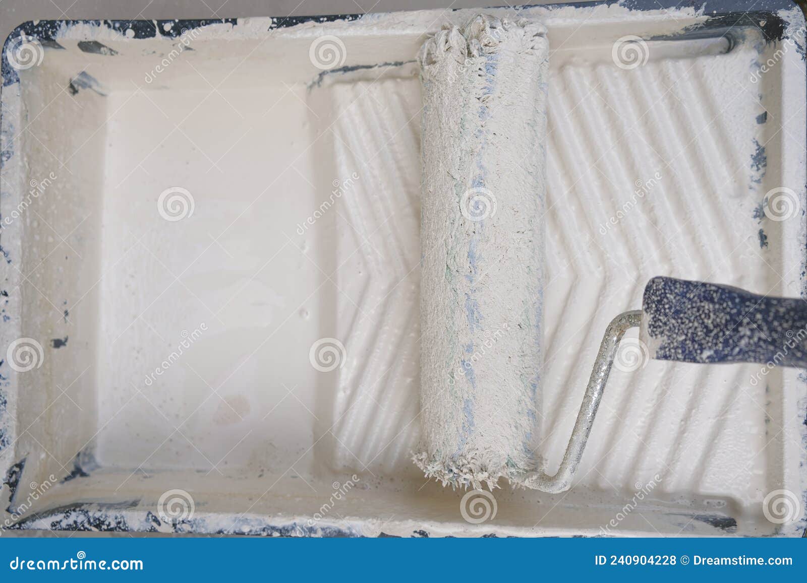 Wall Painting and Renovation. Roller and Paint. Roller in a Container ...