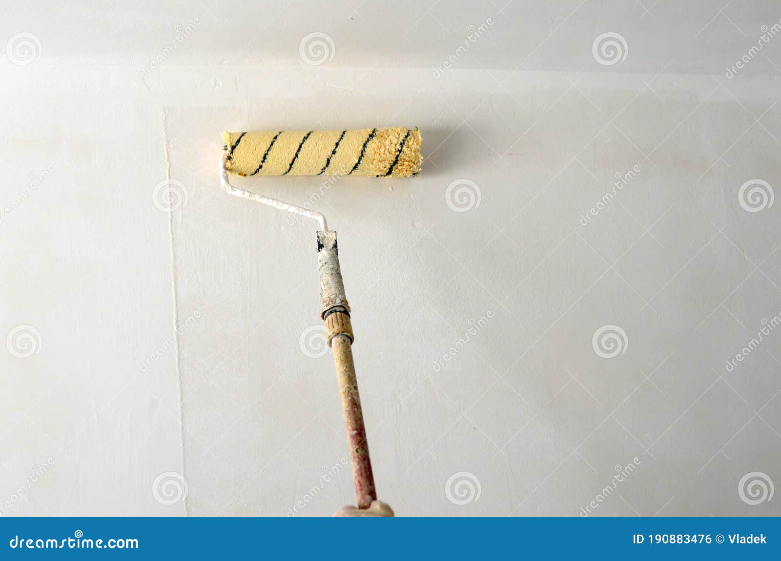 Wall Painting in White with Paint Roller Stock Photo - Image of hold ...