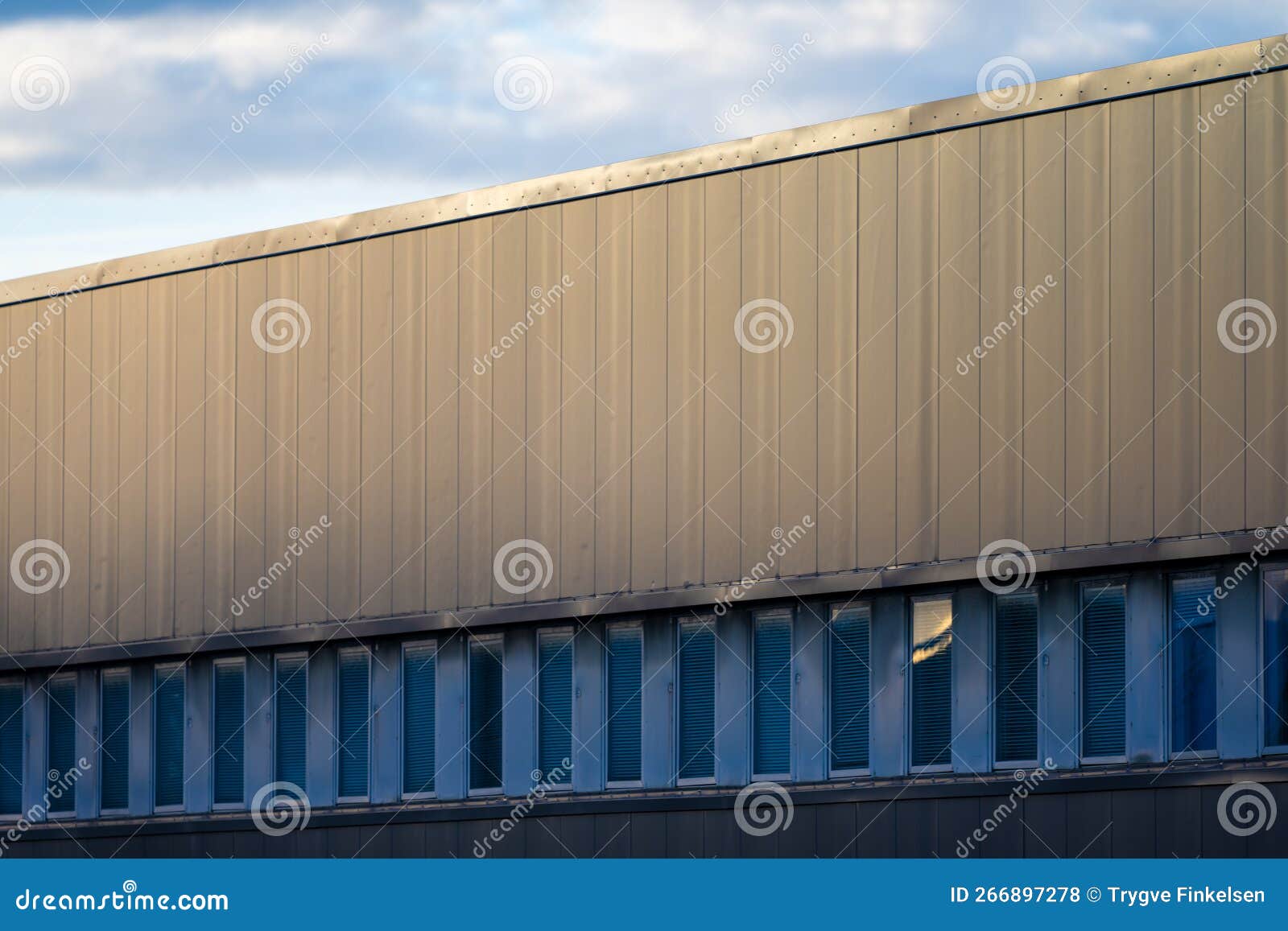Wall Plates Above Windows of a Large Warehouse.. Stock Photo - Image of ...