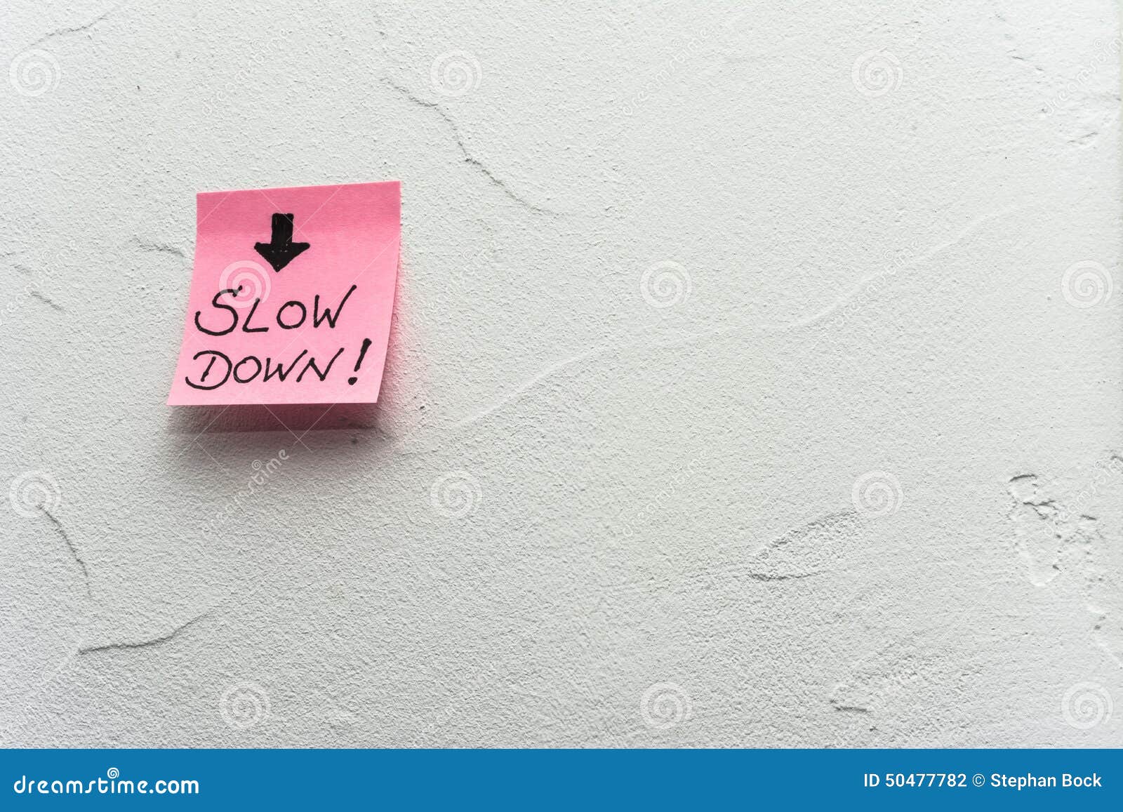 Wall, Post-it Note Slow Down and Arrow Stock Photo - Image of symbol ...