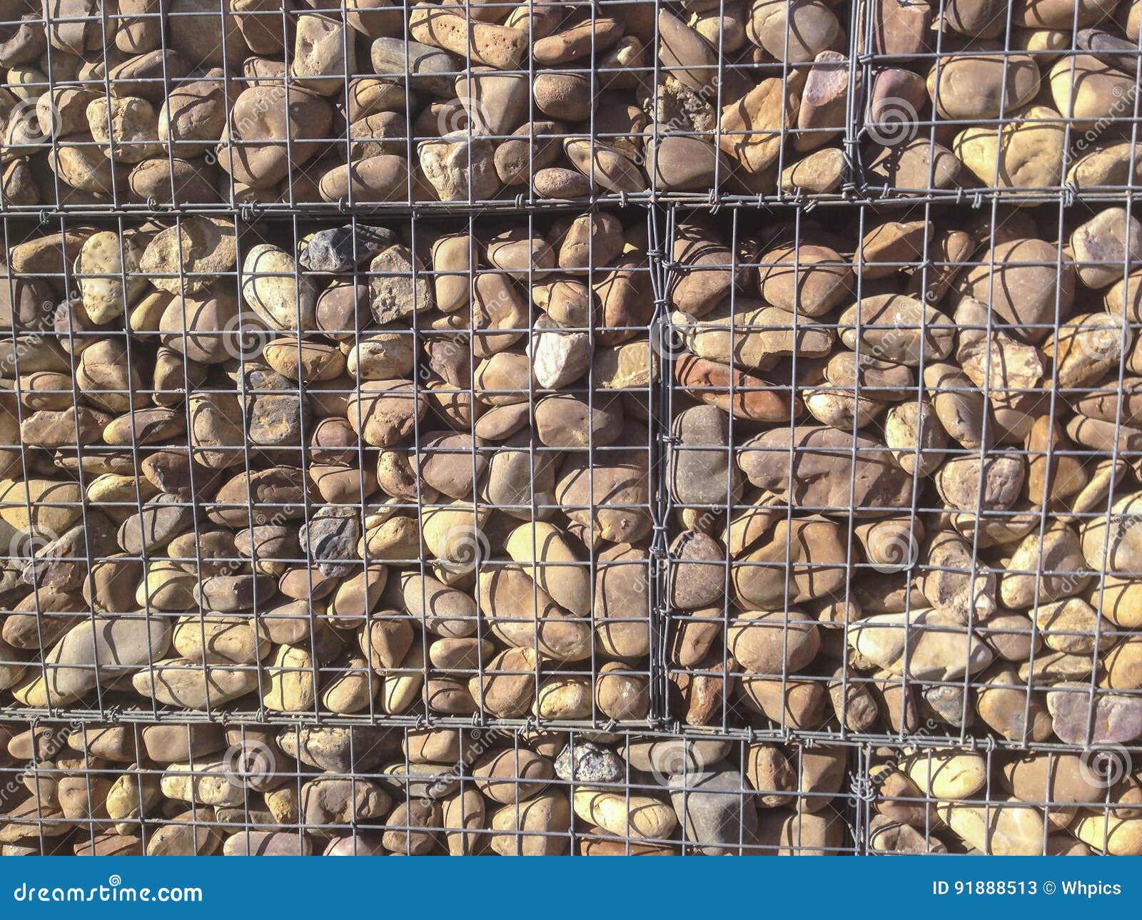 Wall Protected with River Pebble Stones in Iron Mesh Stock Image ...