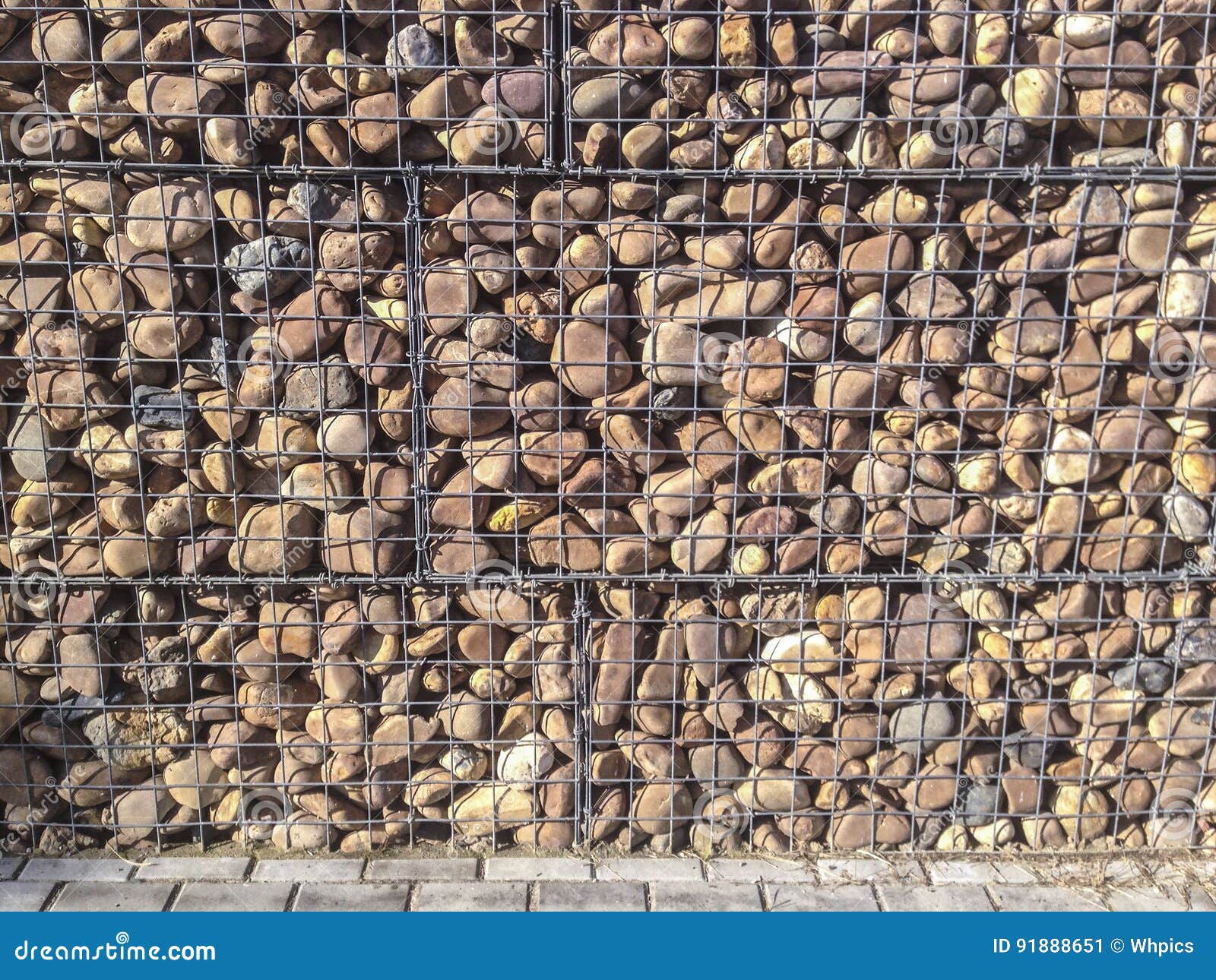 Wall Protected with River Pebble Stones in Iron Mesh Stock Image ...