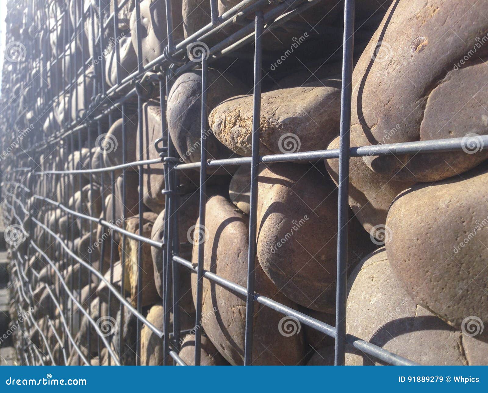 Wall Protected with River Pebble Stones in Iron Mesh Stock Image ...