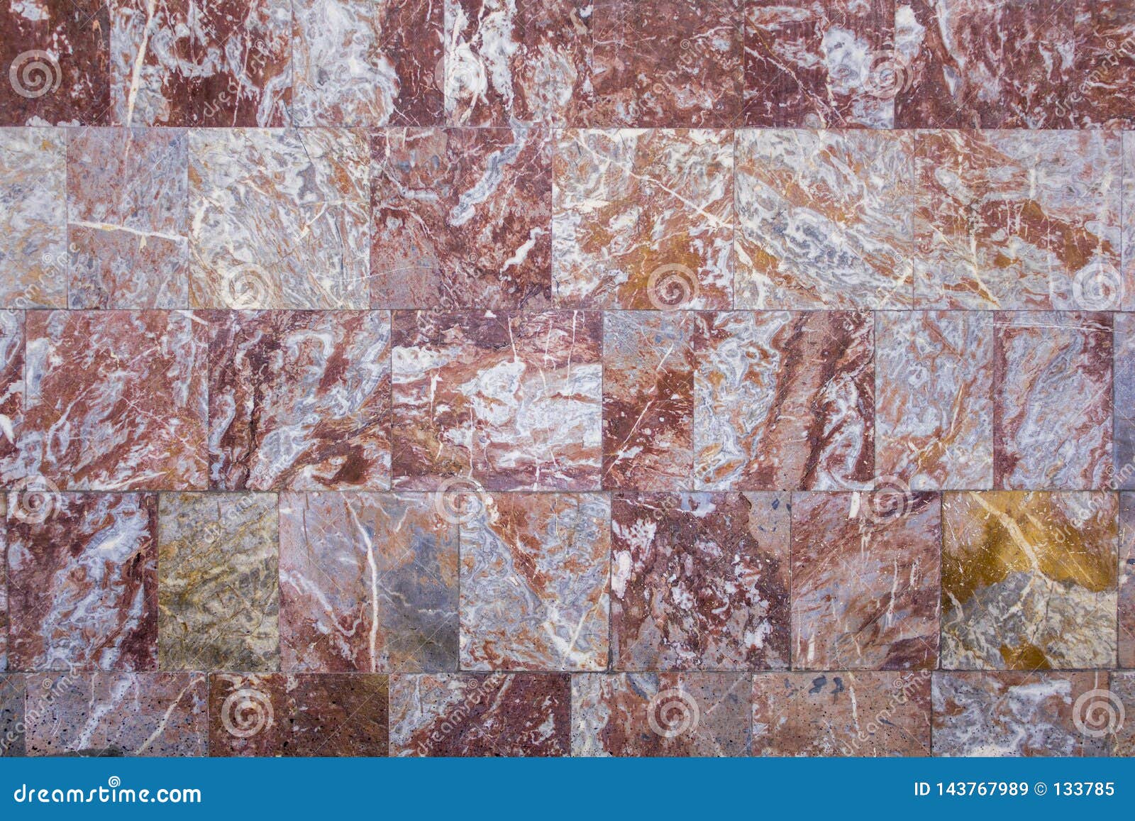 Wall of Red Marble Granite Tiles with White and Gray Spots. Rough ...
