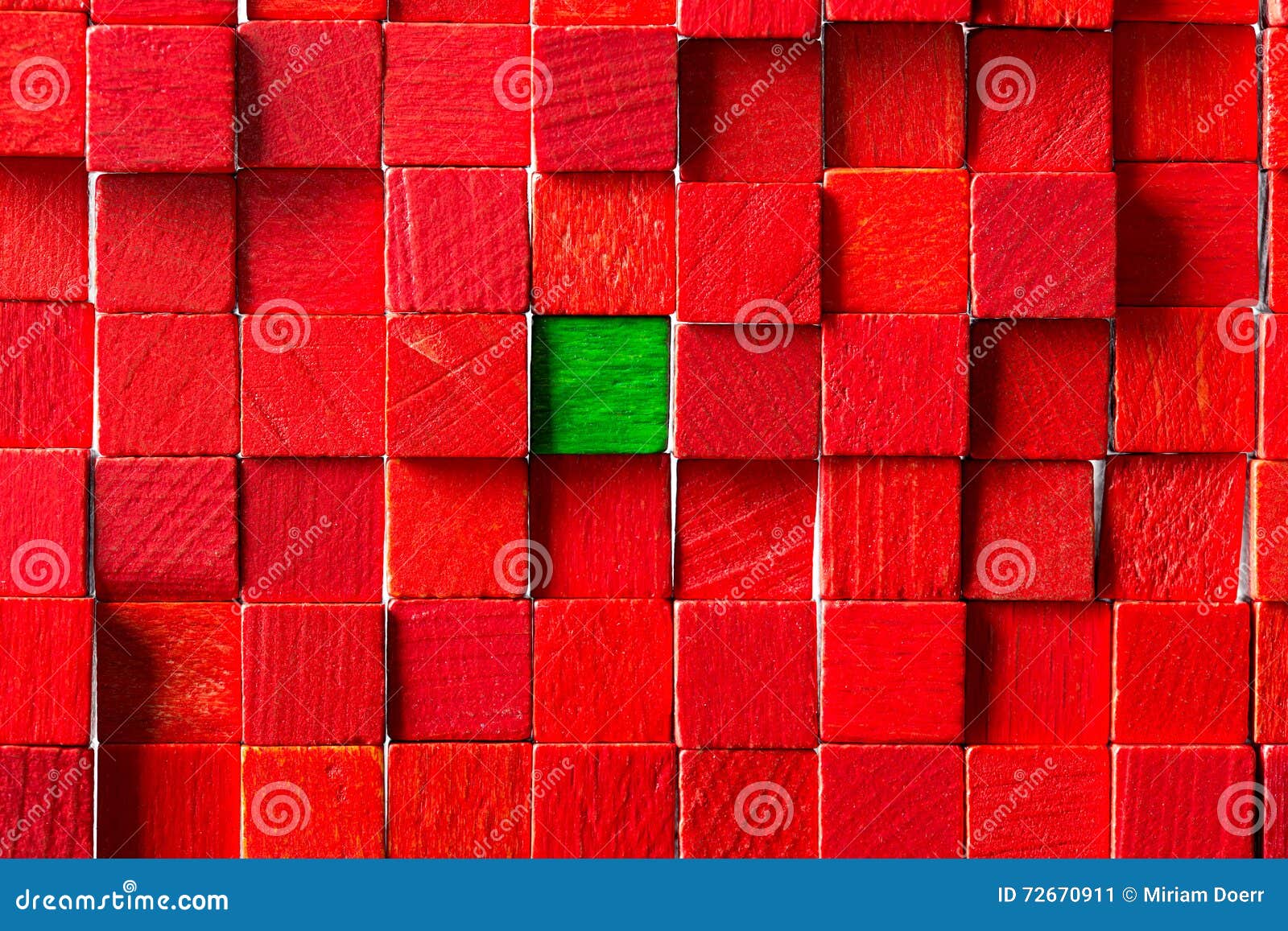 Wall of Red Toy Blocks, Green Block in the Middle Stock Image - Image ...