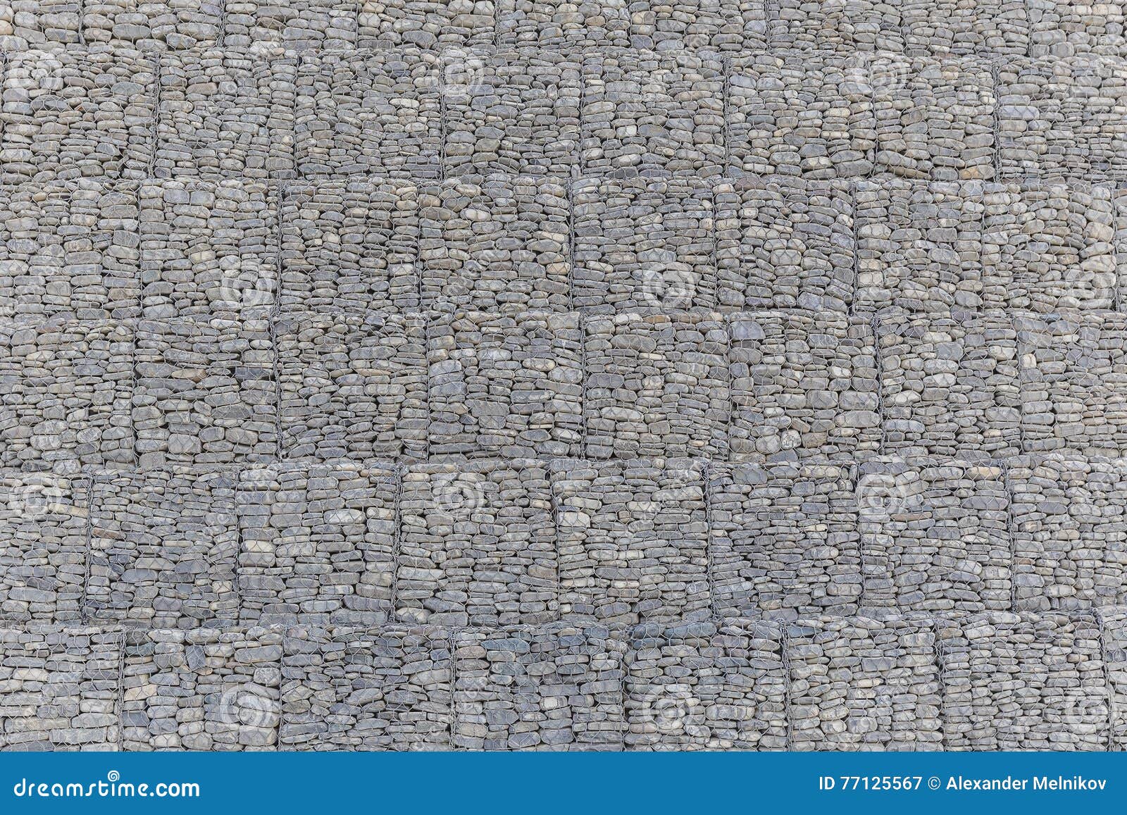 The Wall of River Stones Packed in a Metal Grid Stock Image - Image of ...