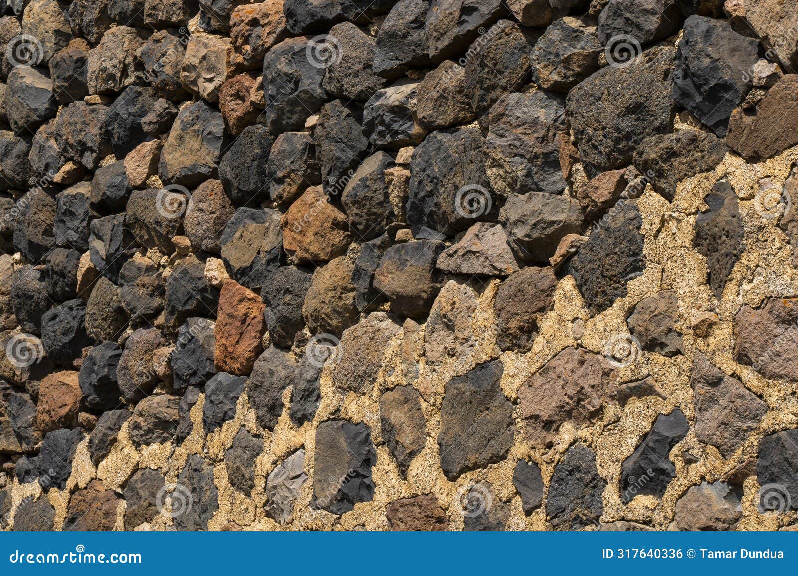 Wall with rock and stones stock photo. Image of rock - 317640336