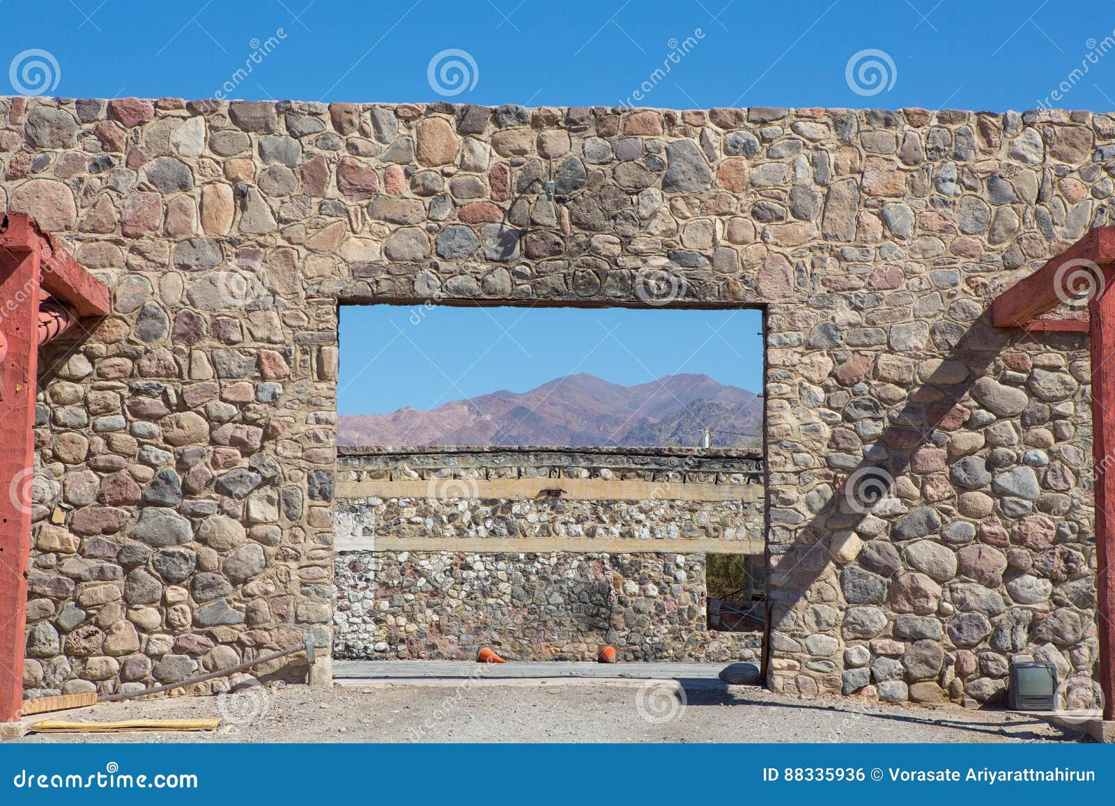 Wall Rock Window with Mountain in Background Stock Photo - Image of ...
