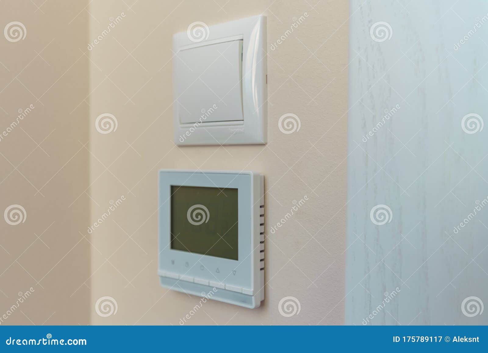 On the Wall of the Room There is a Light Switch and Under it a Floor ...